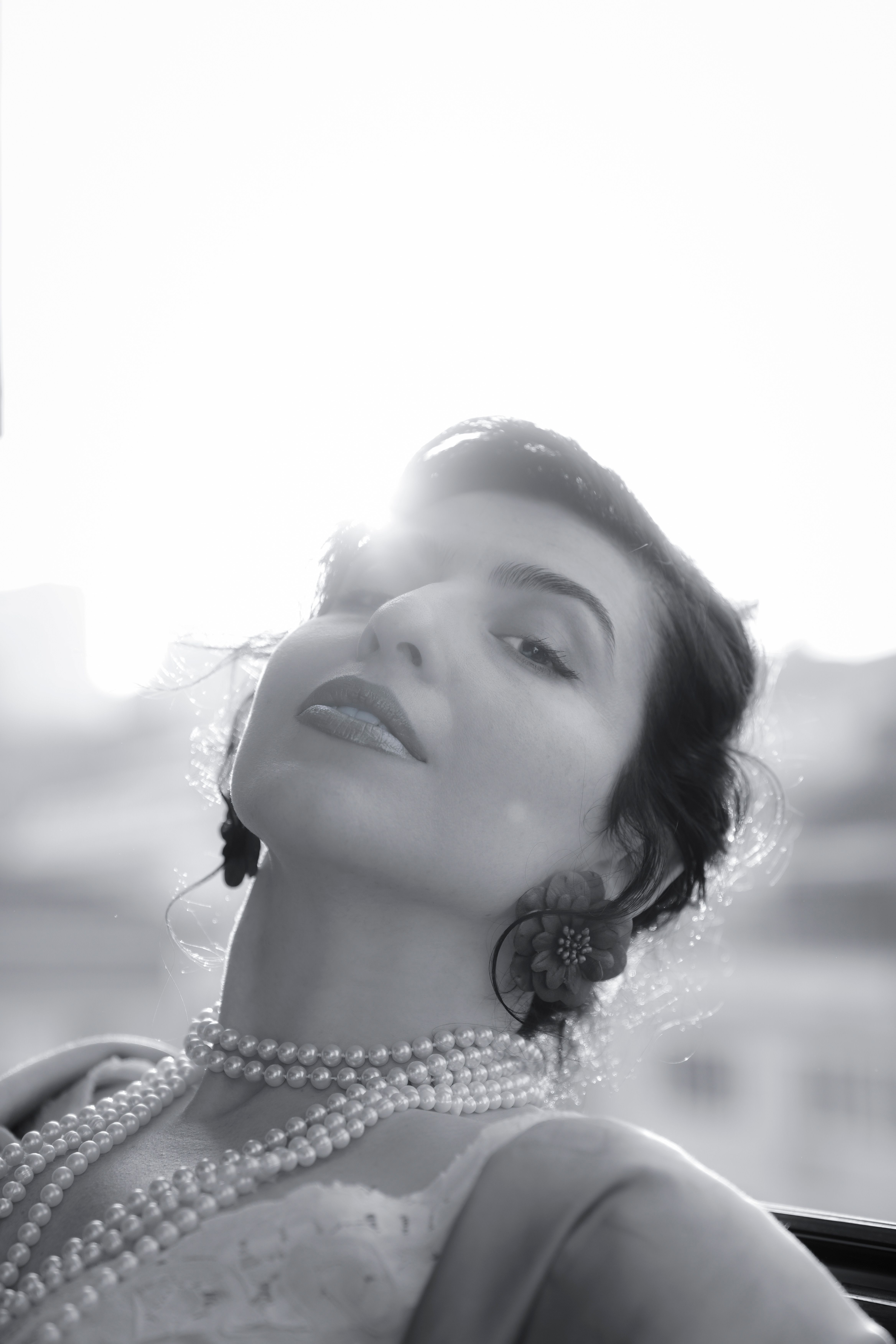 Portrait of Woman Laughing and Throwing Her Head Back · Free Stock Photo