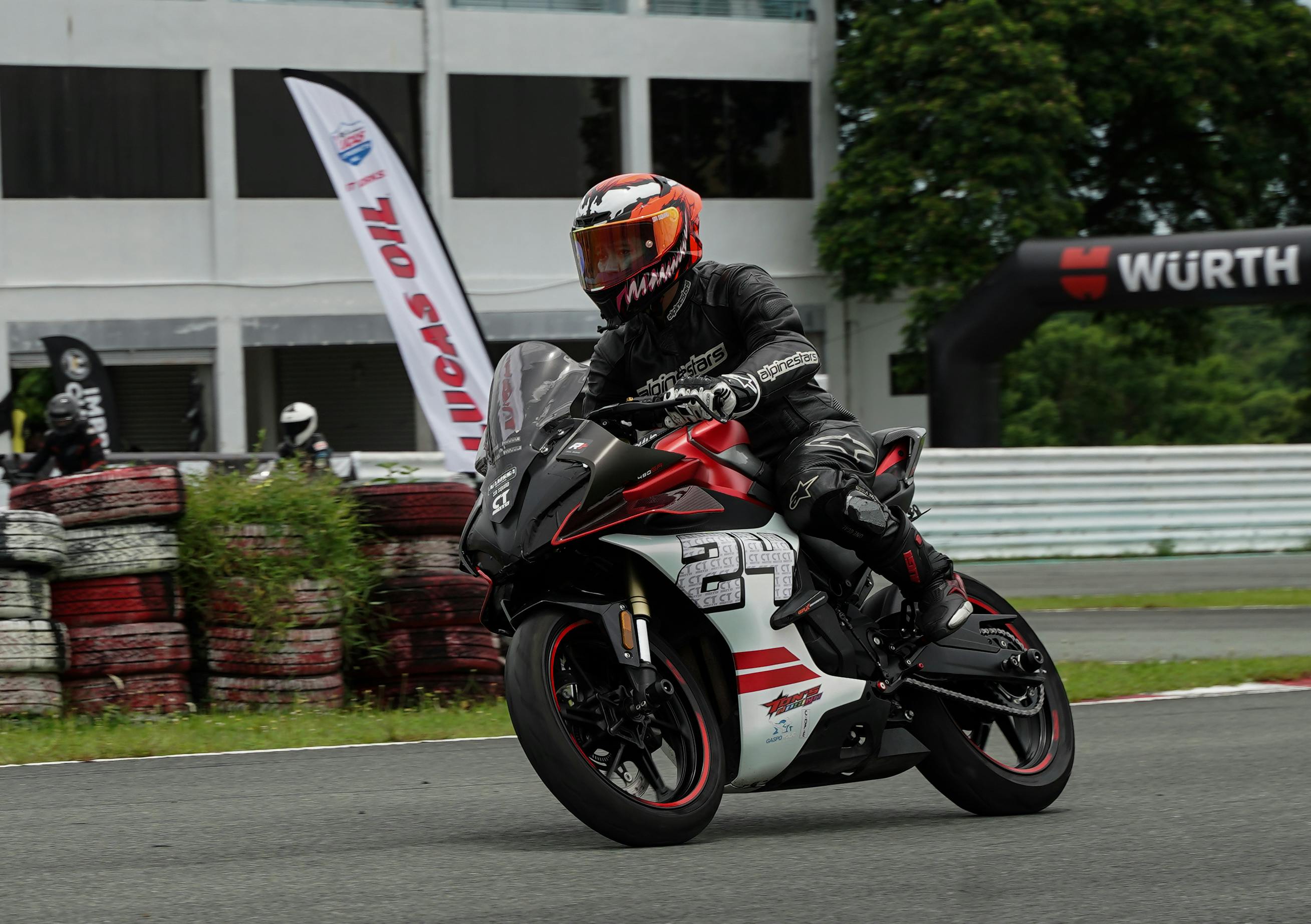 Person Riding Super Bike during Night Race · Free Stock Photo