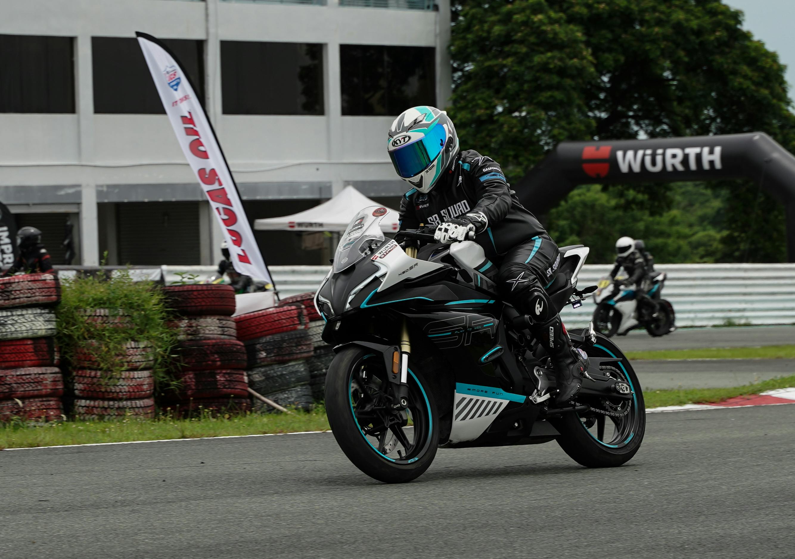Person Riding Super Bike during Night Race · Free Stock Photo