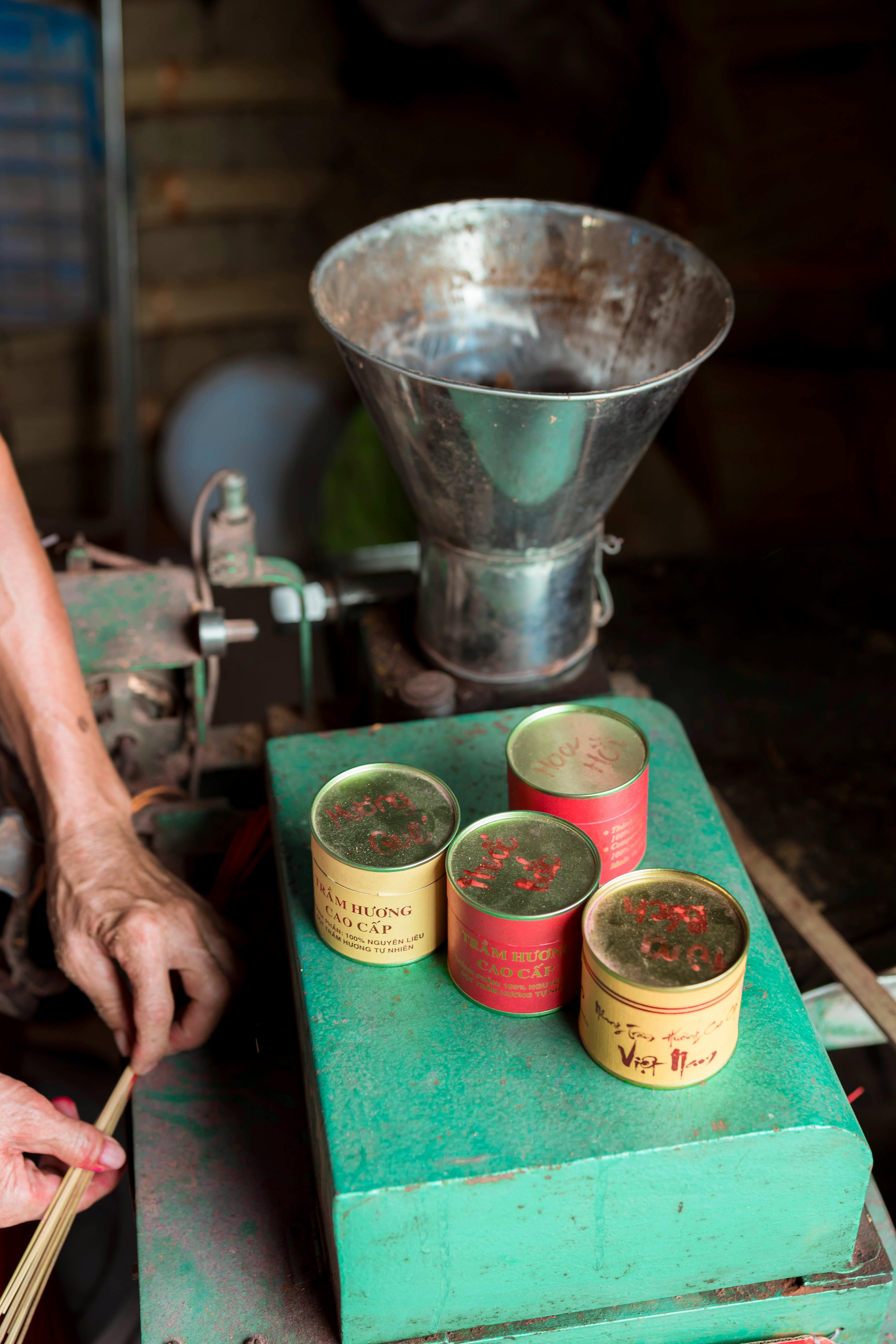 A woman is making some food in a kitchen · Free Stock Photo
