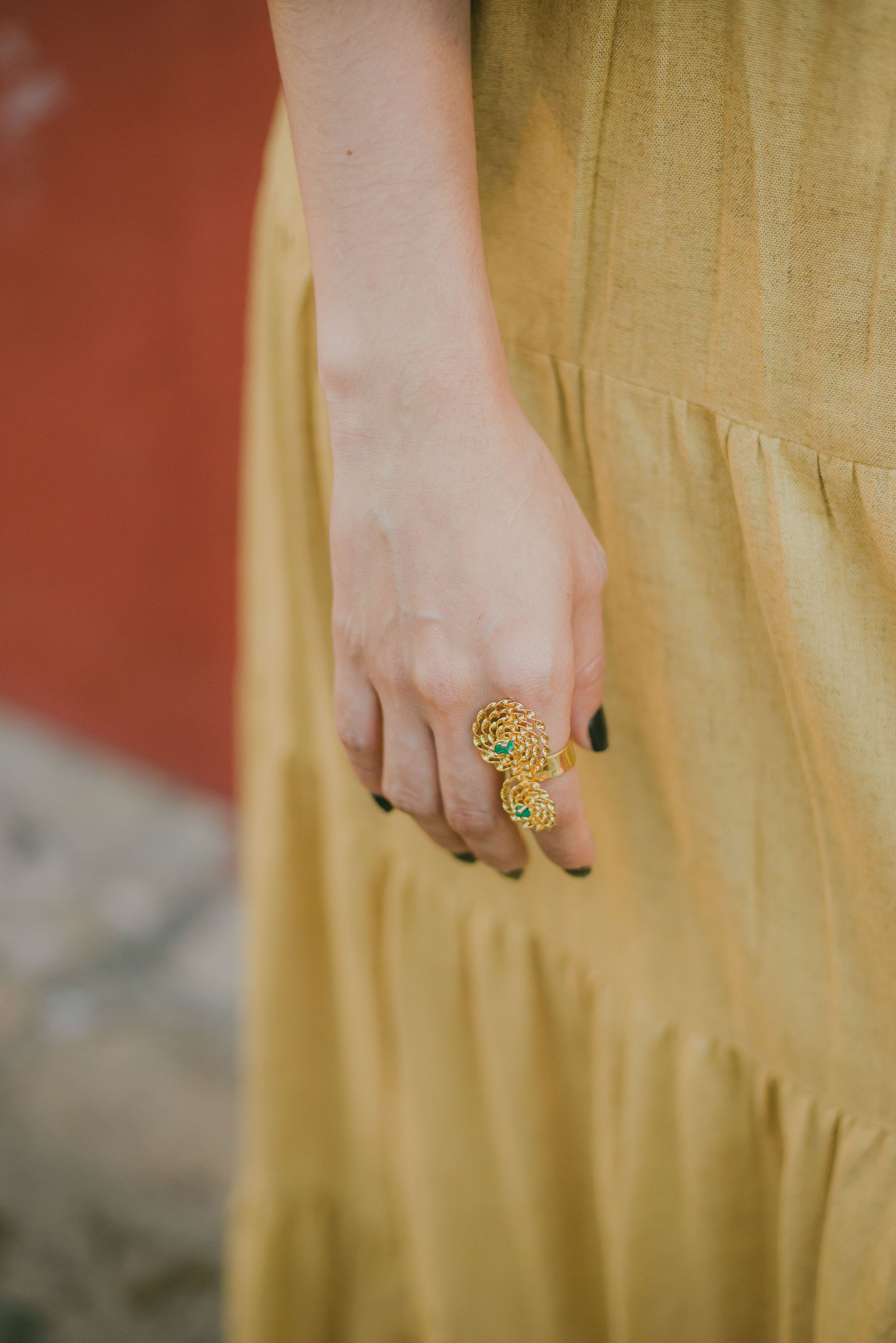 A woman wearing a yellow dress and a ring · Free Stock Photo