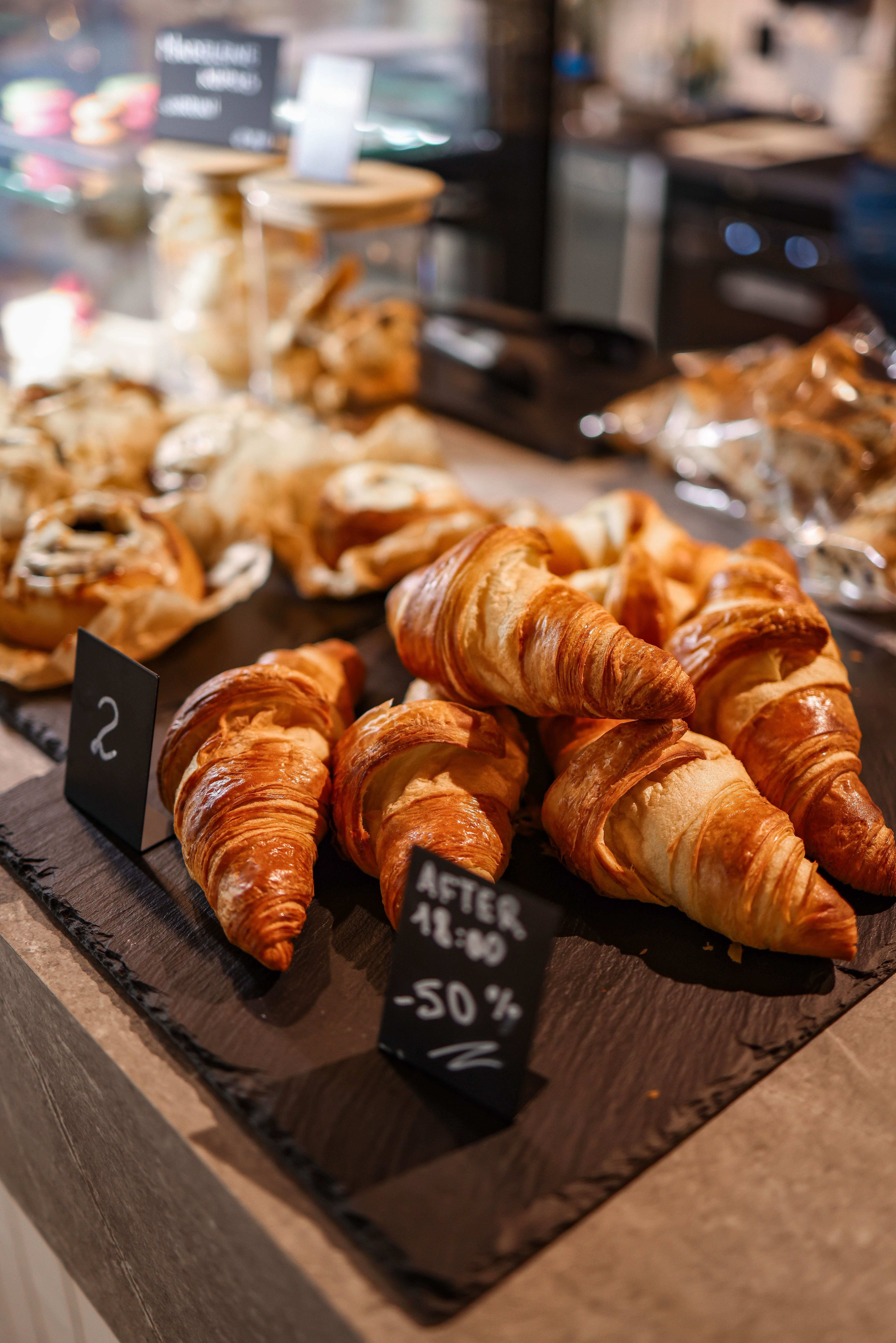 A display of croissants and other baked goods · Free Stock Photo