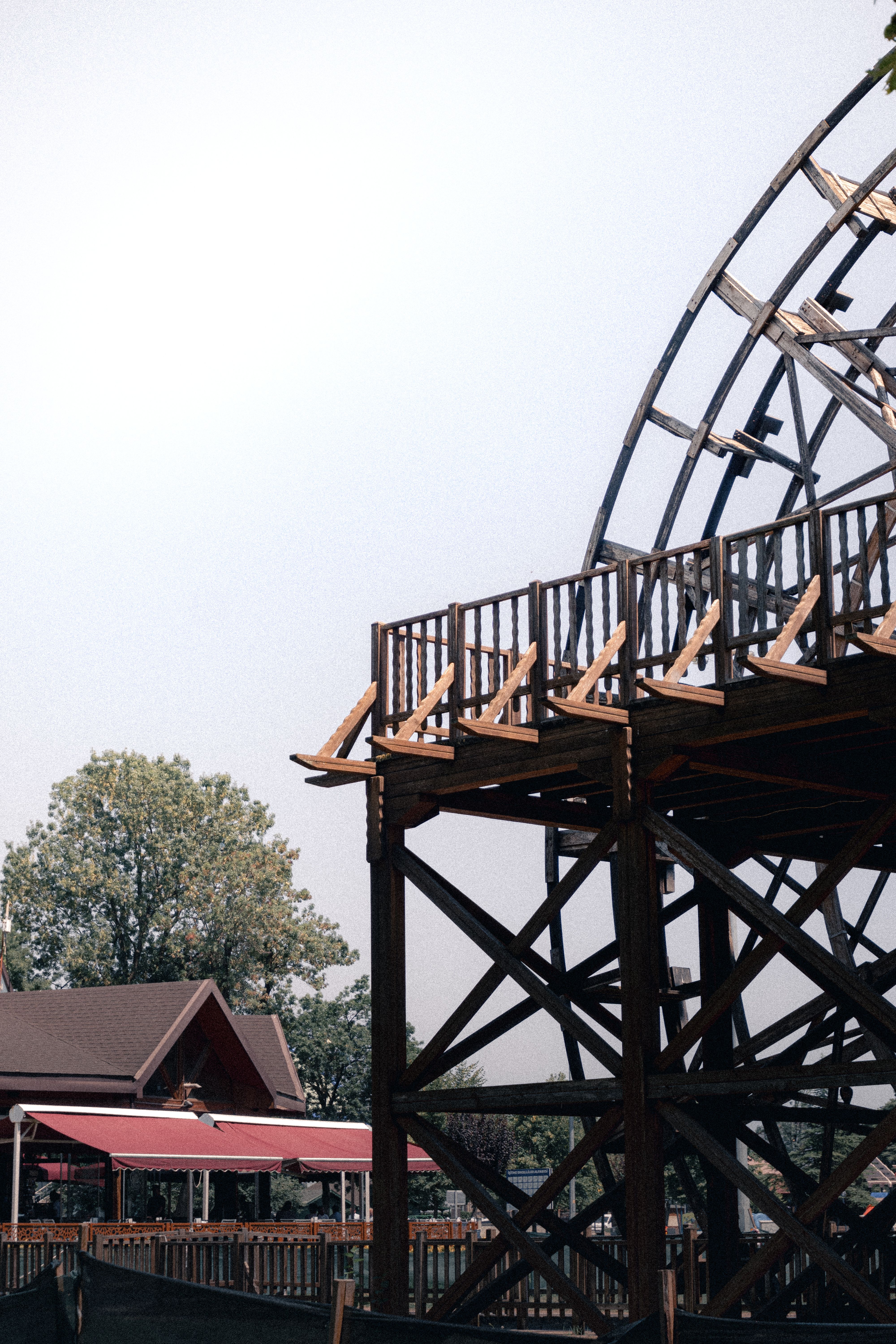 A wooden structure with a wooden deck and a wooden fence · Free Stock Photo