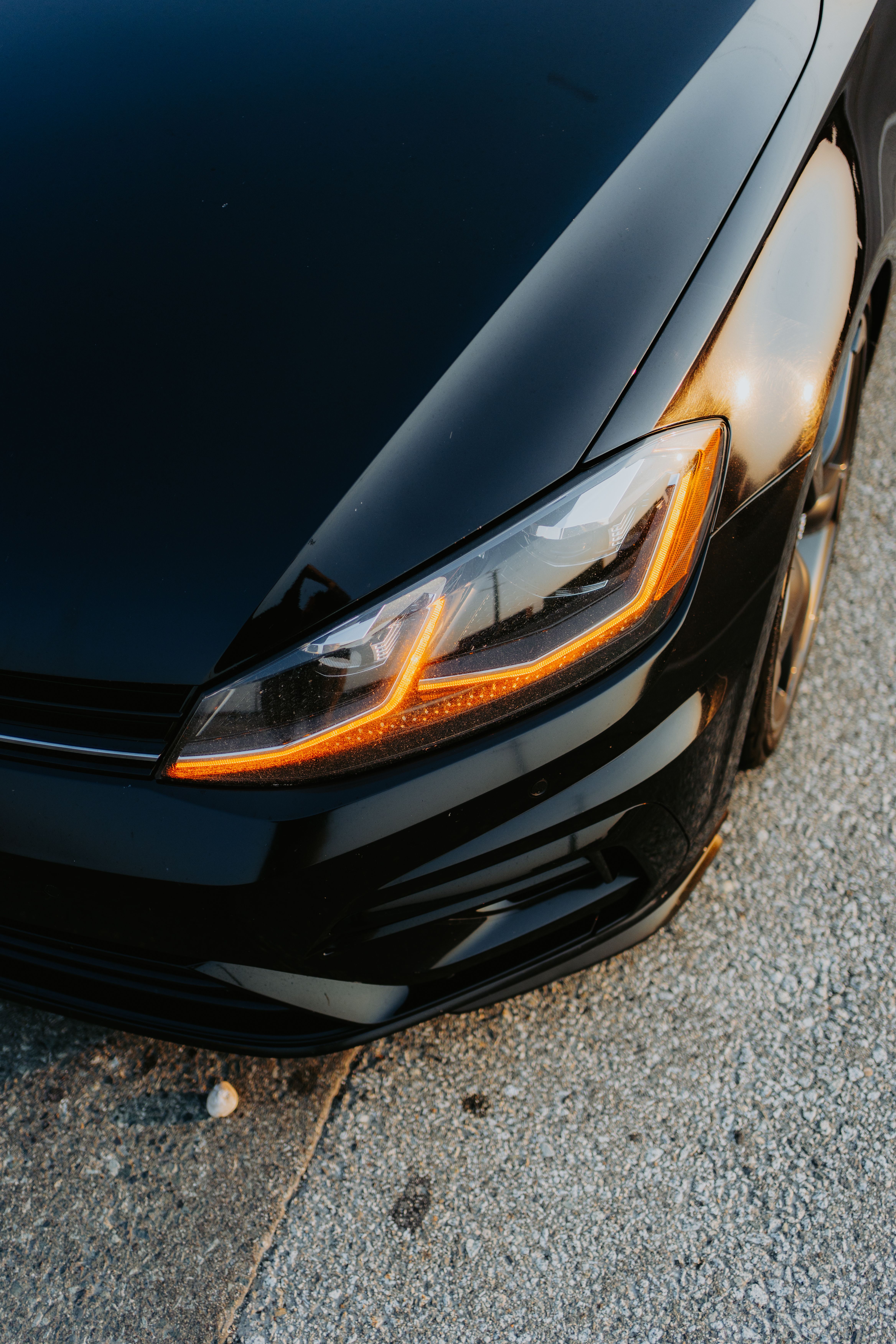 A close up of a black car's headlights · Free Stock Photo