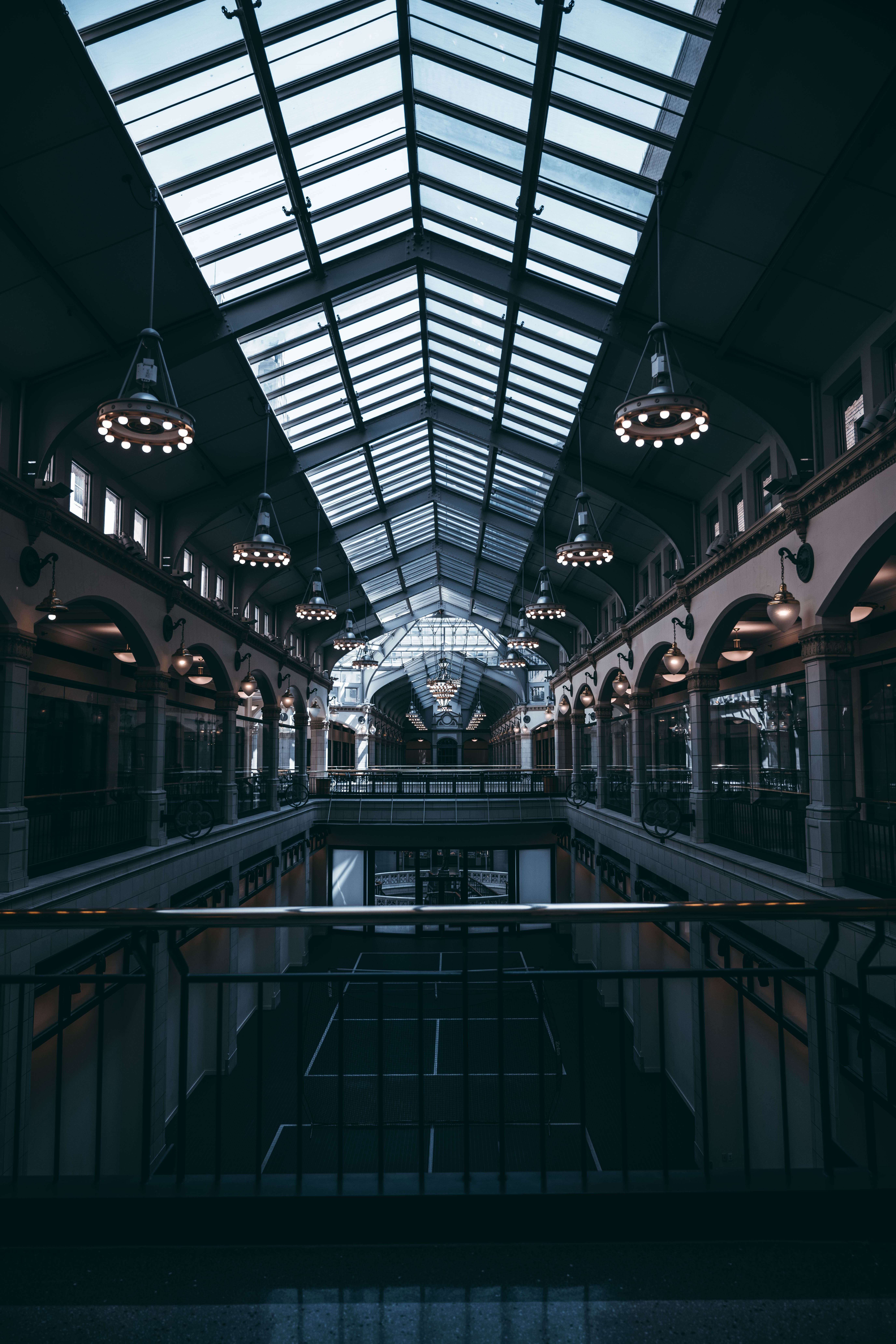 The inside of an old building with skylights · Free Stock Photo