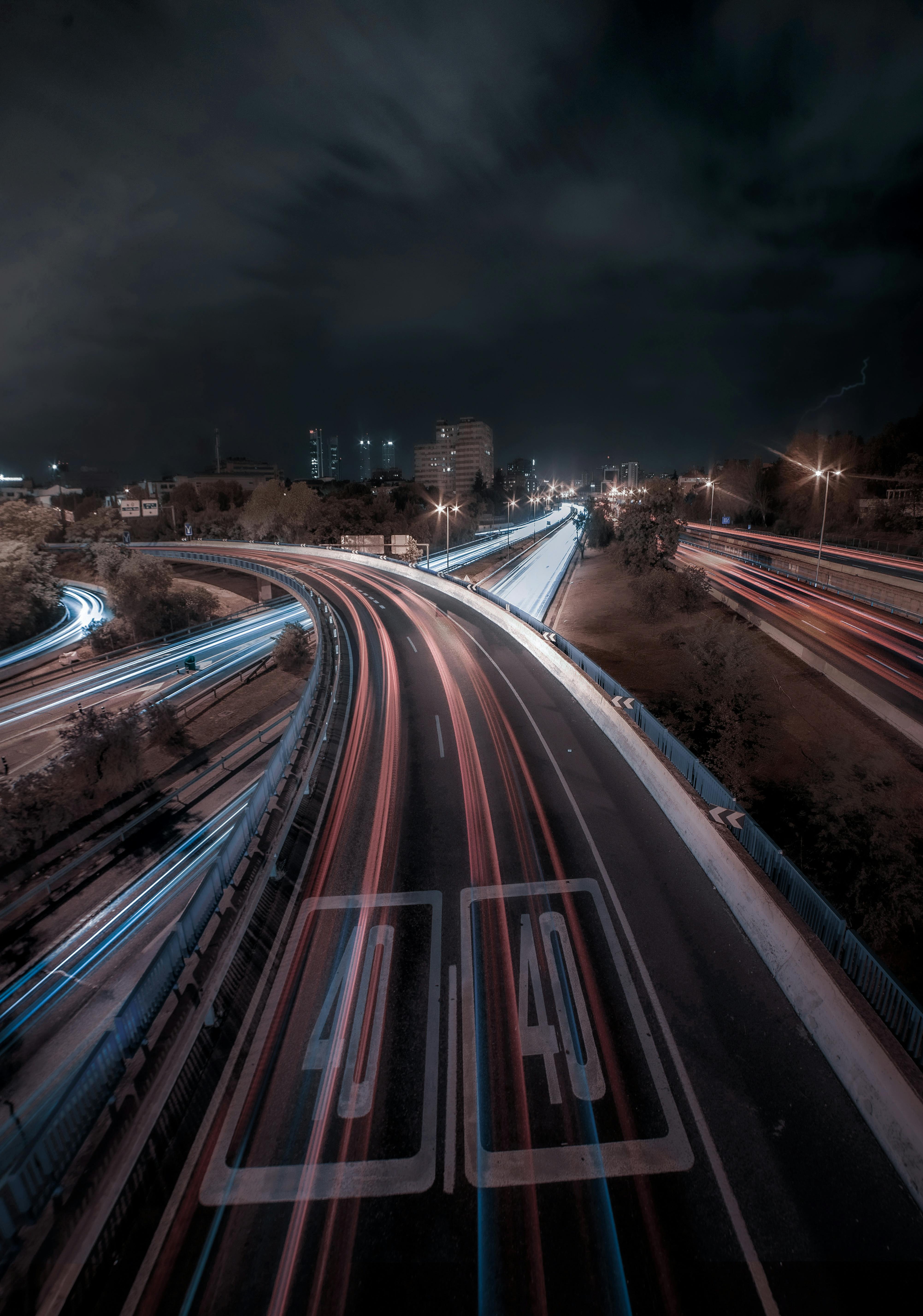 Gray Concrete Road With Buildings Light Exposure Photography · Free ...