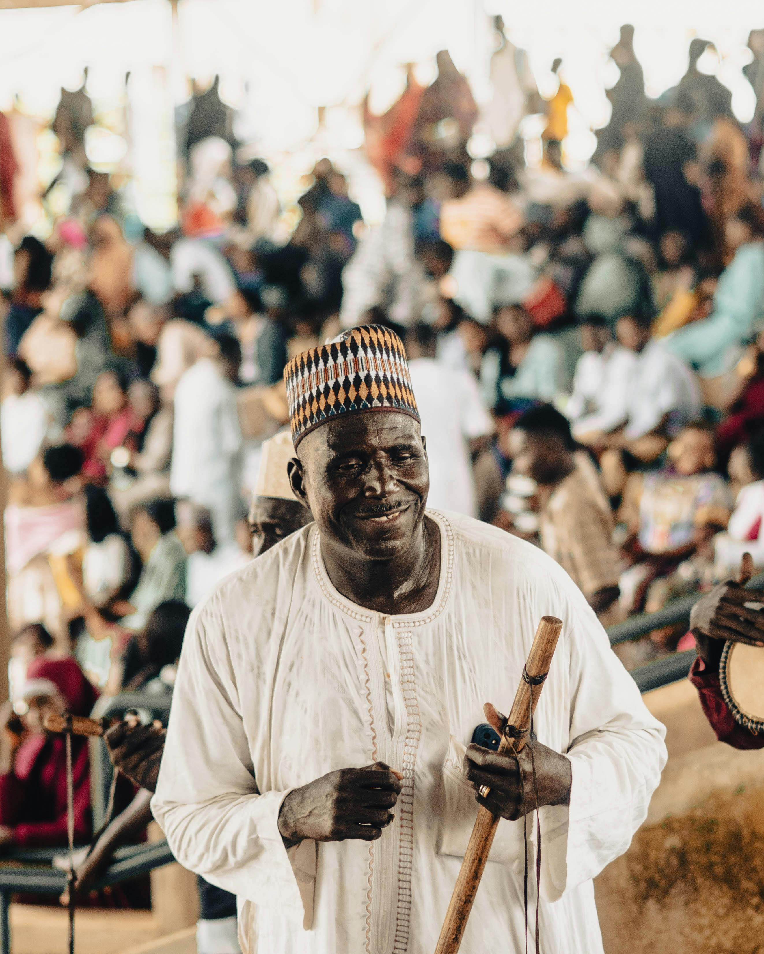 men in a traditional band playing local instruments · Free Stock Photo