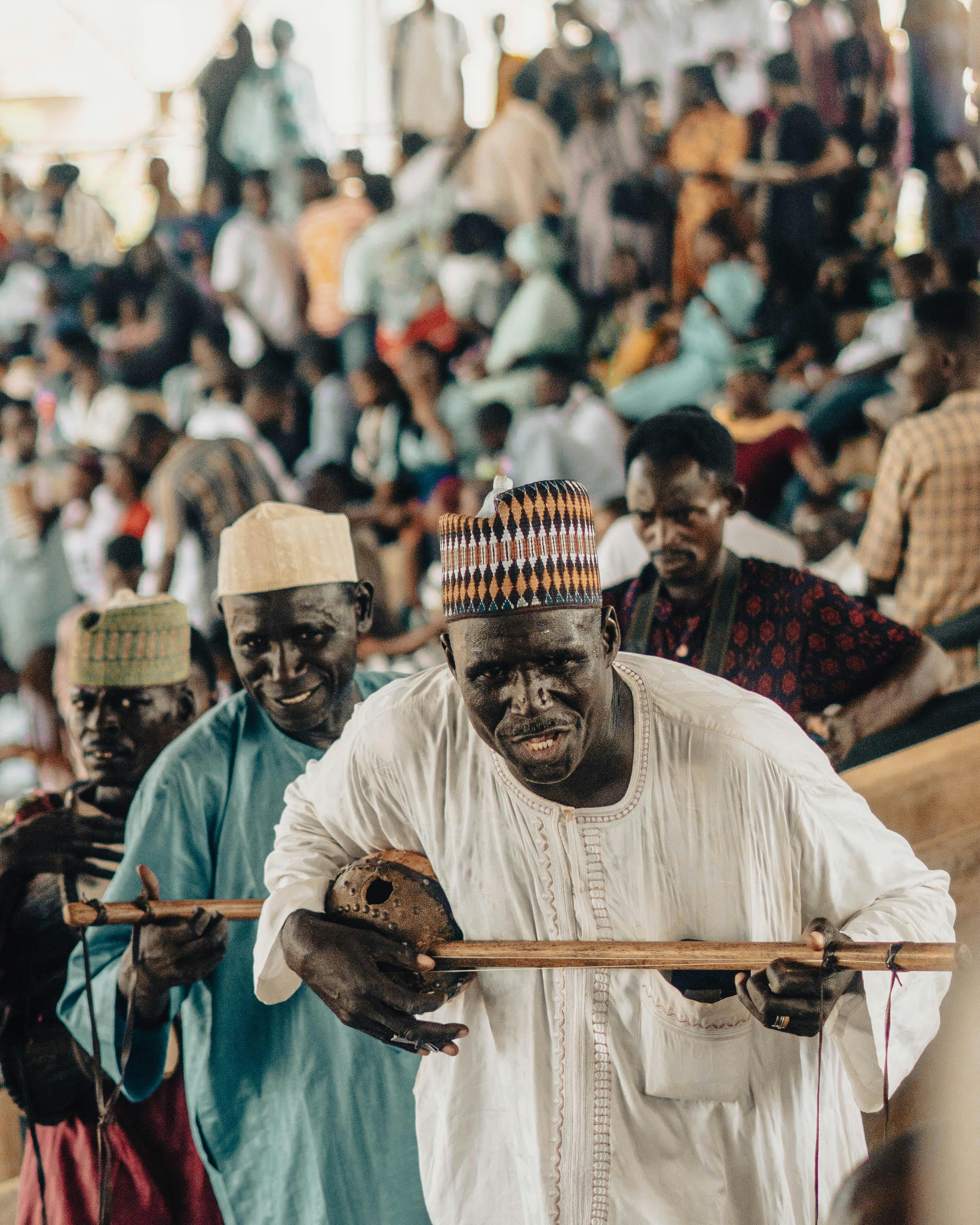 men in a traditional band playing local instruments · Free Stock Photo