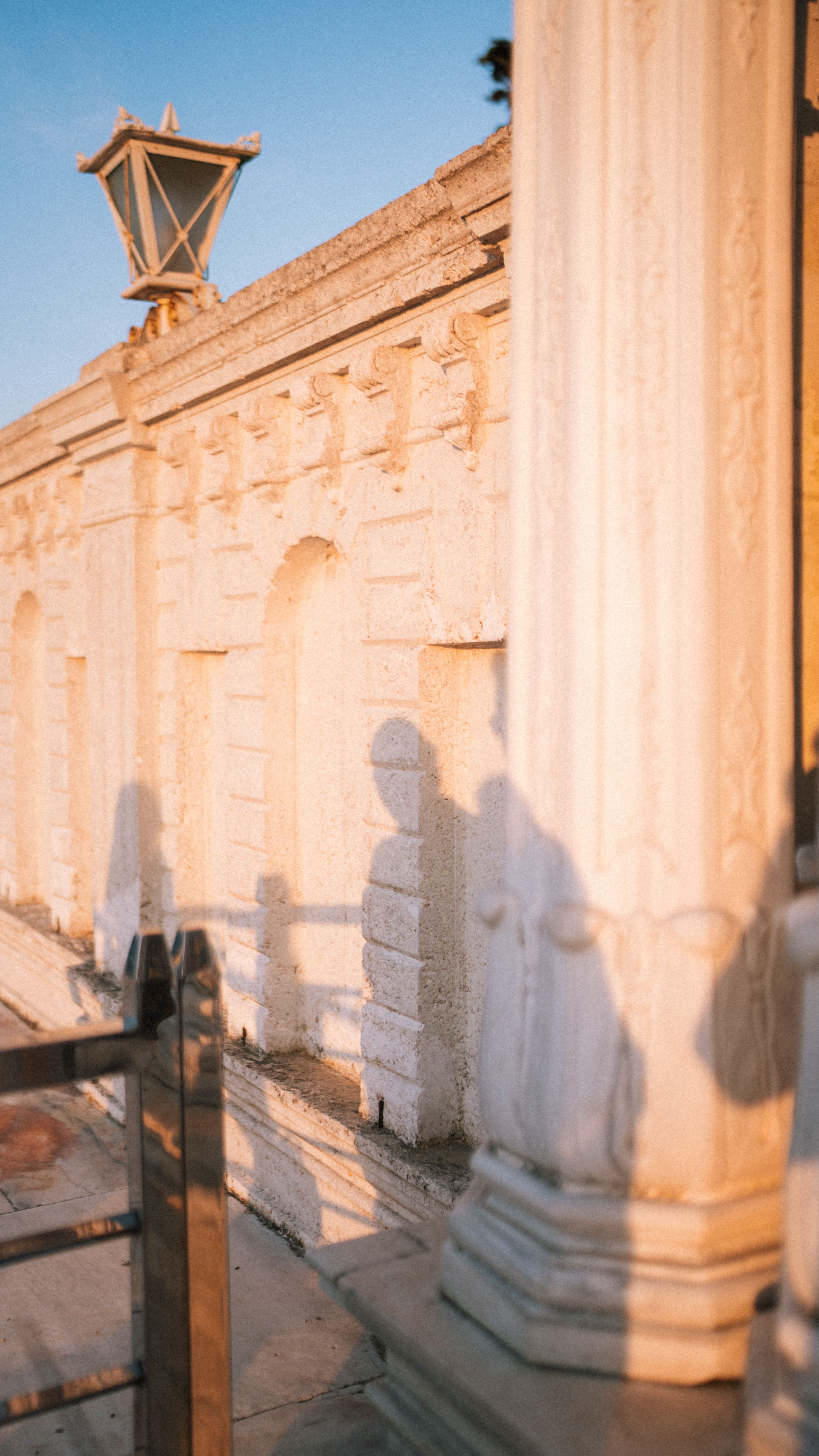 A man is standing in front of a building · Free Stock Photo