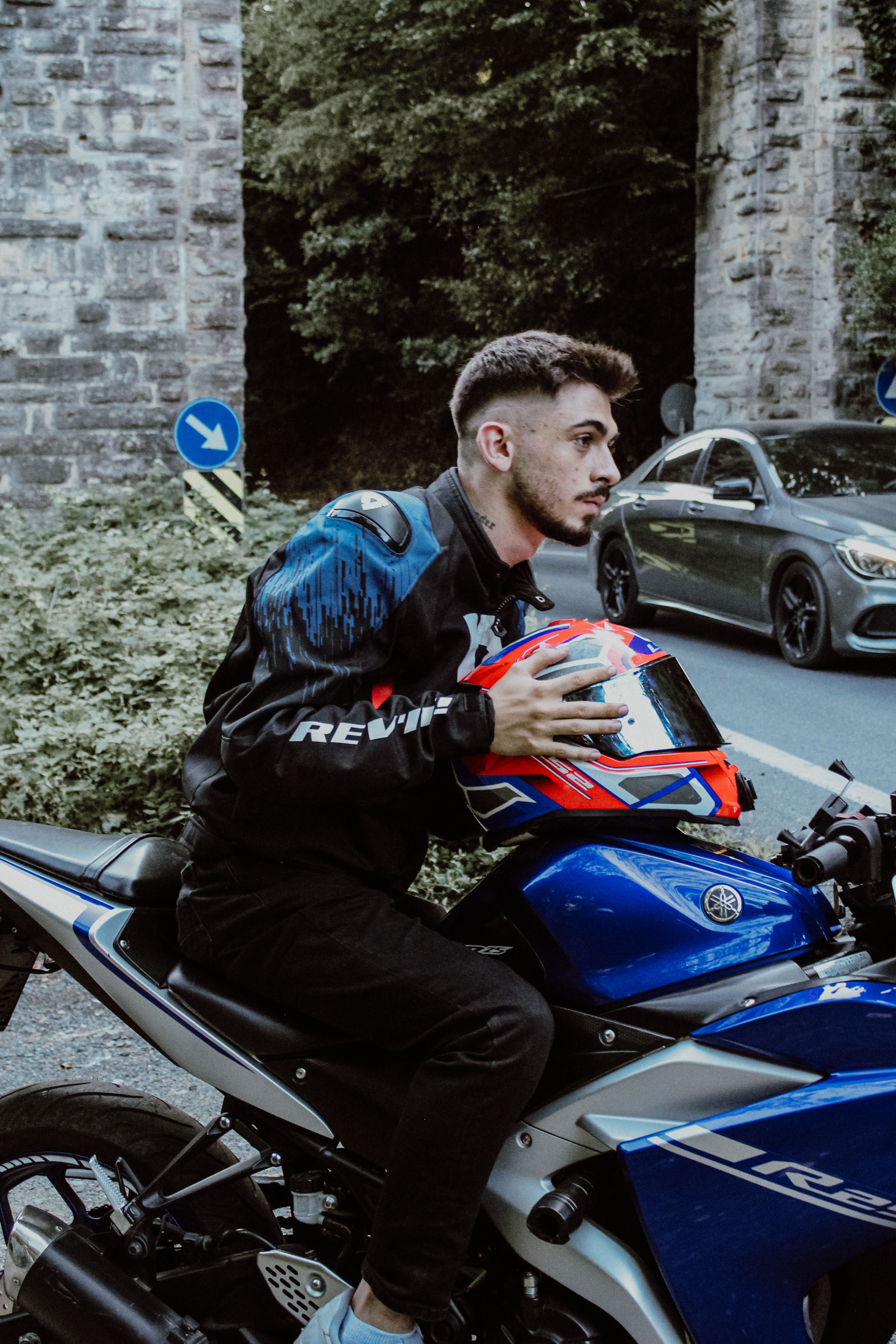 A man sitting on a motorcycle with his hands on the handlebars · Free ...