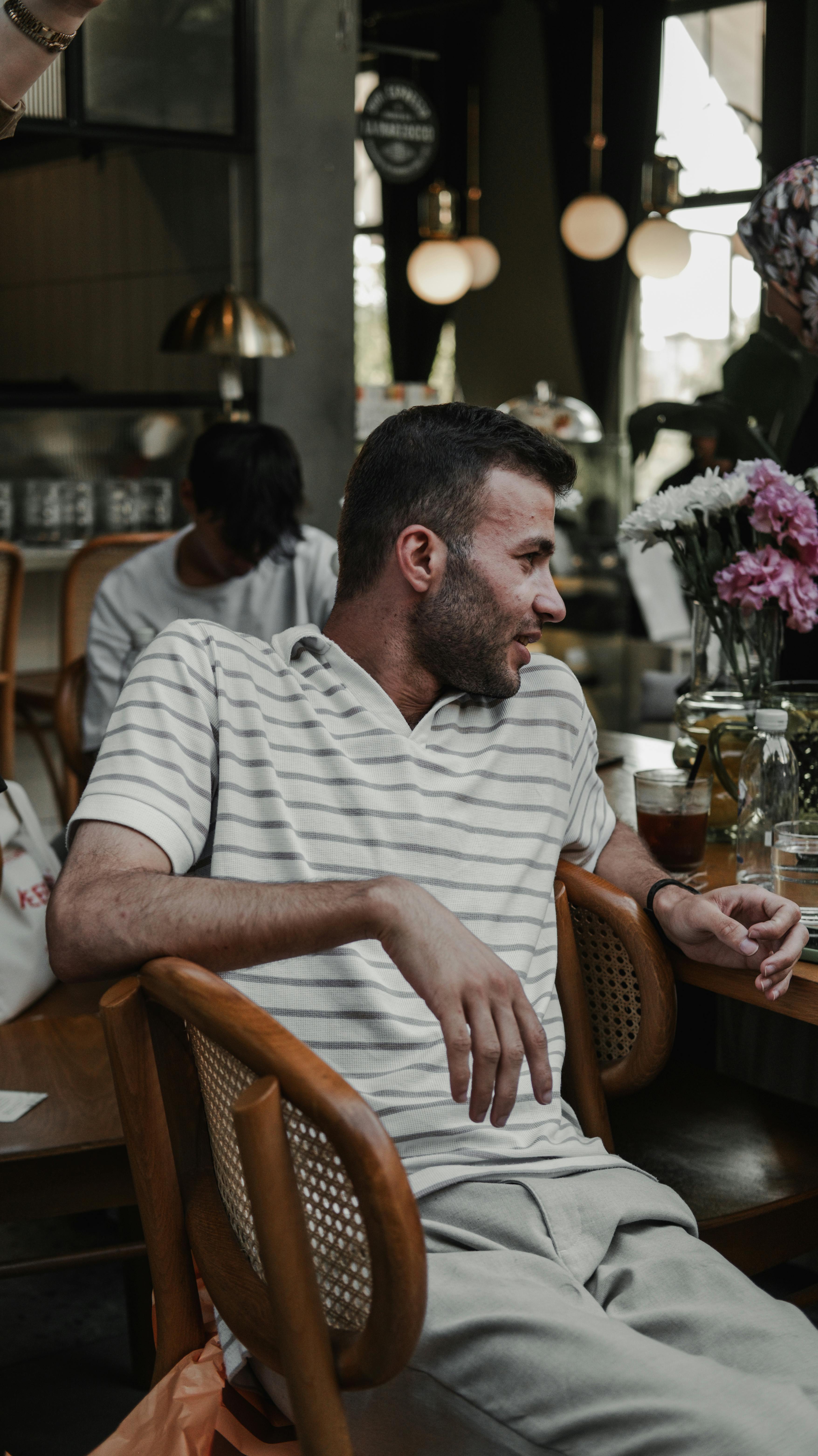 Content senior ethnic man enjoying coffee in outdoor cafe · Free Stock ...