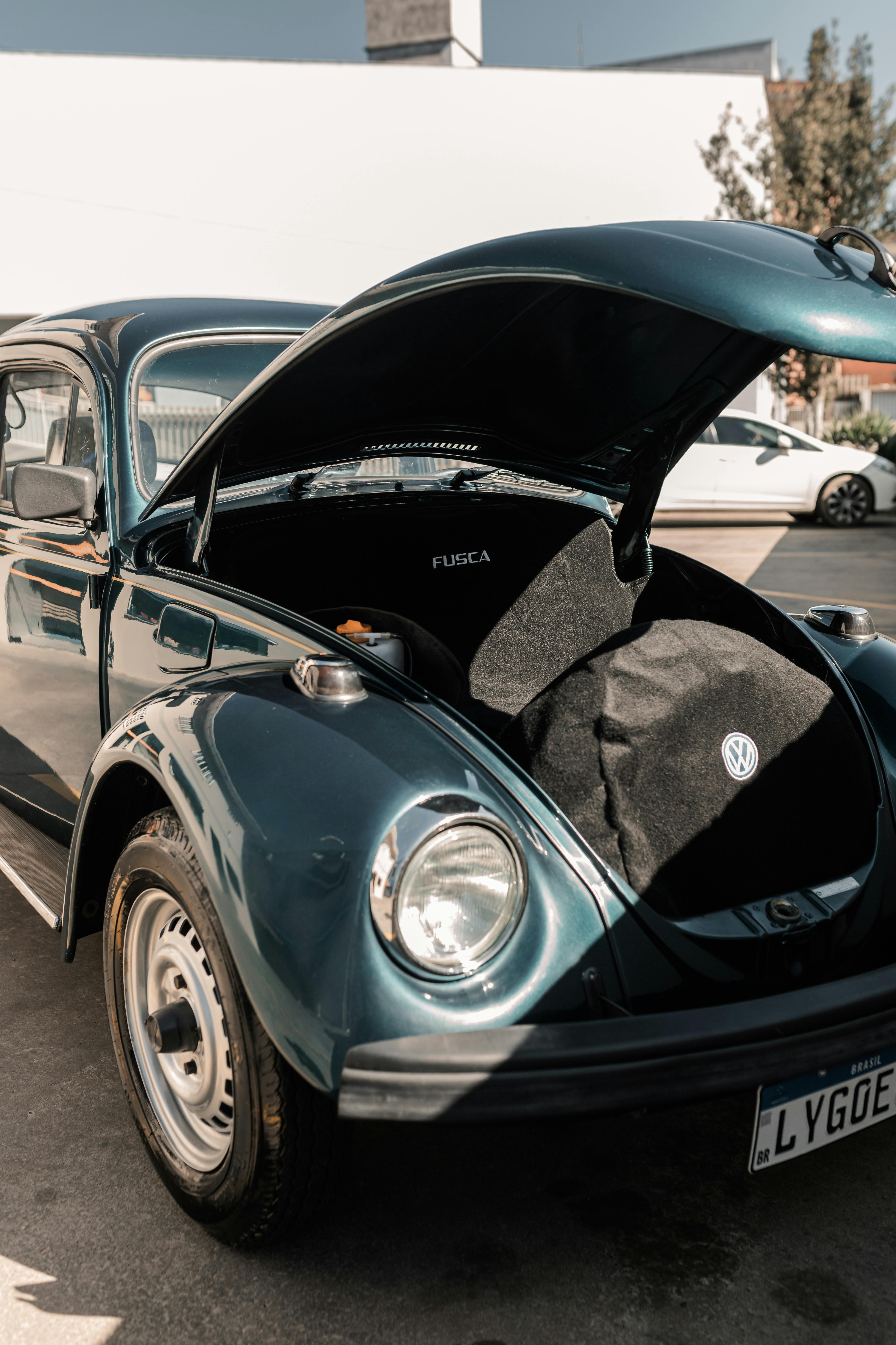 A vw beetle with its hood open · Free Stock Photo