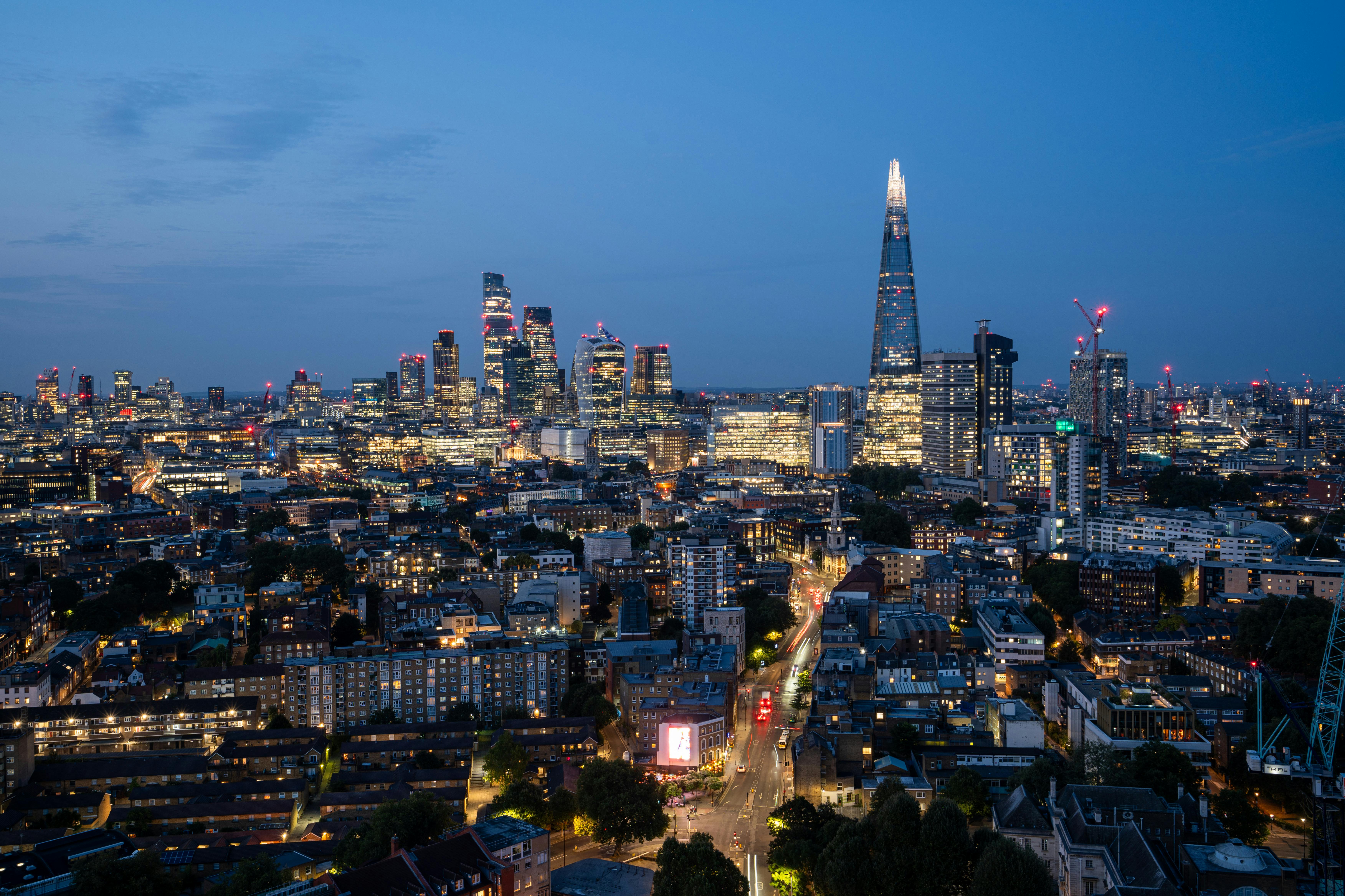 The city of london at night with the shard in the background · Free ...