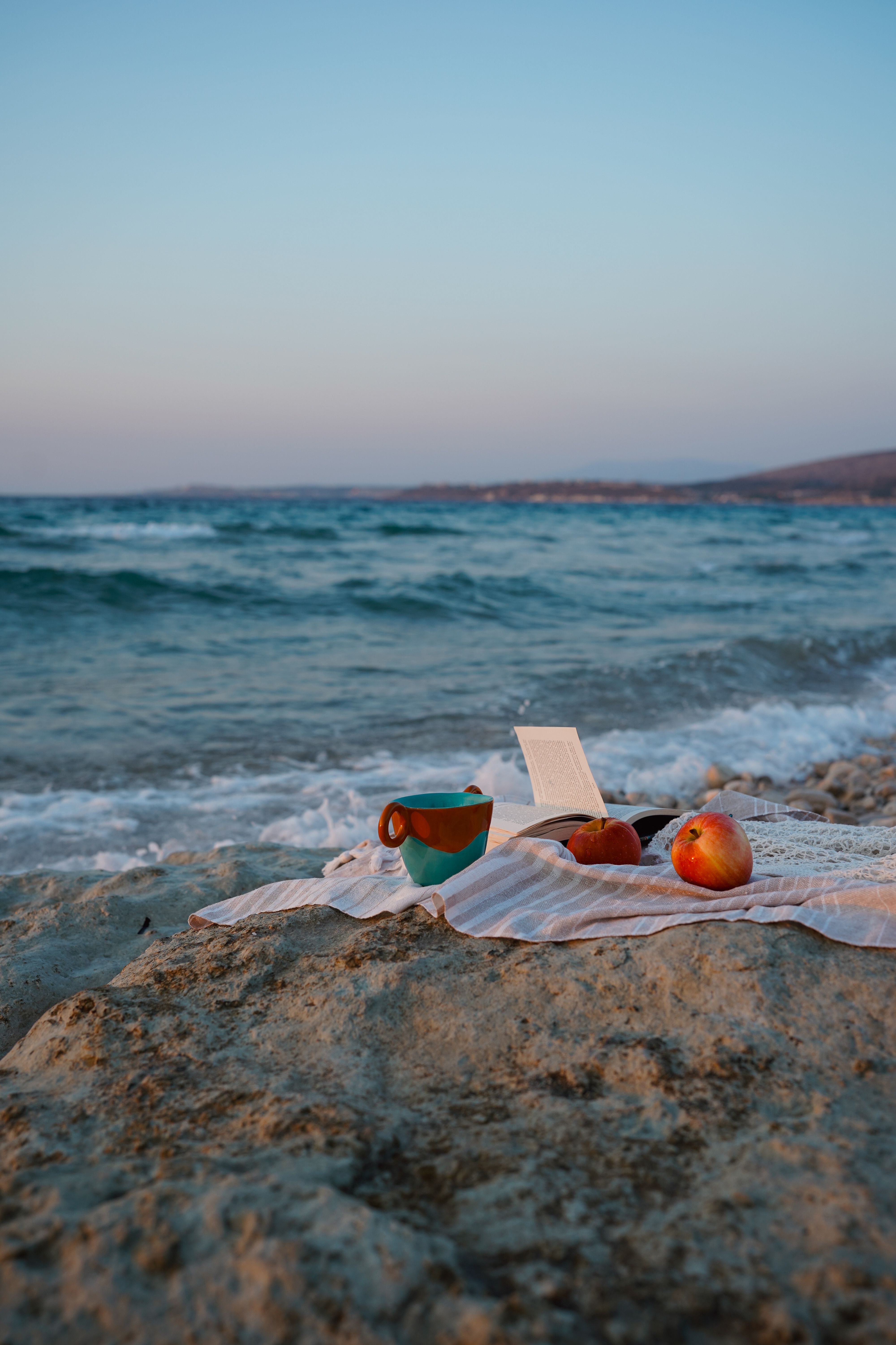 Blanket on a Rocky Beach · Free Stock Photo