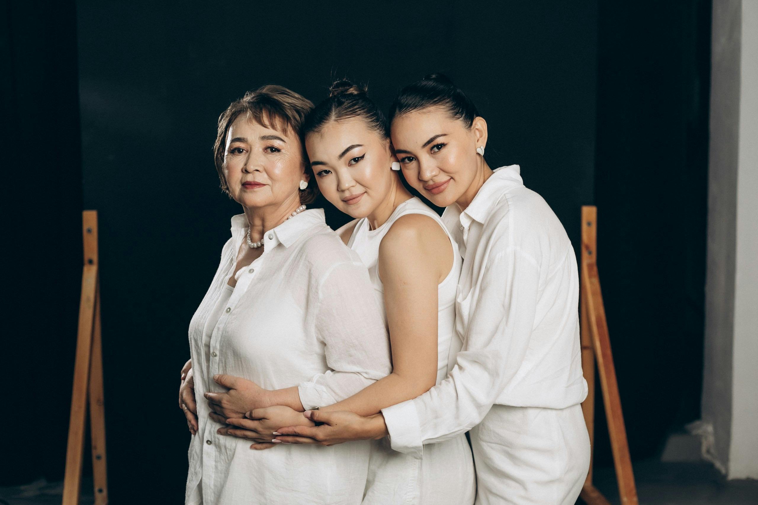 Three Women Posing Together · Free Stock Photo