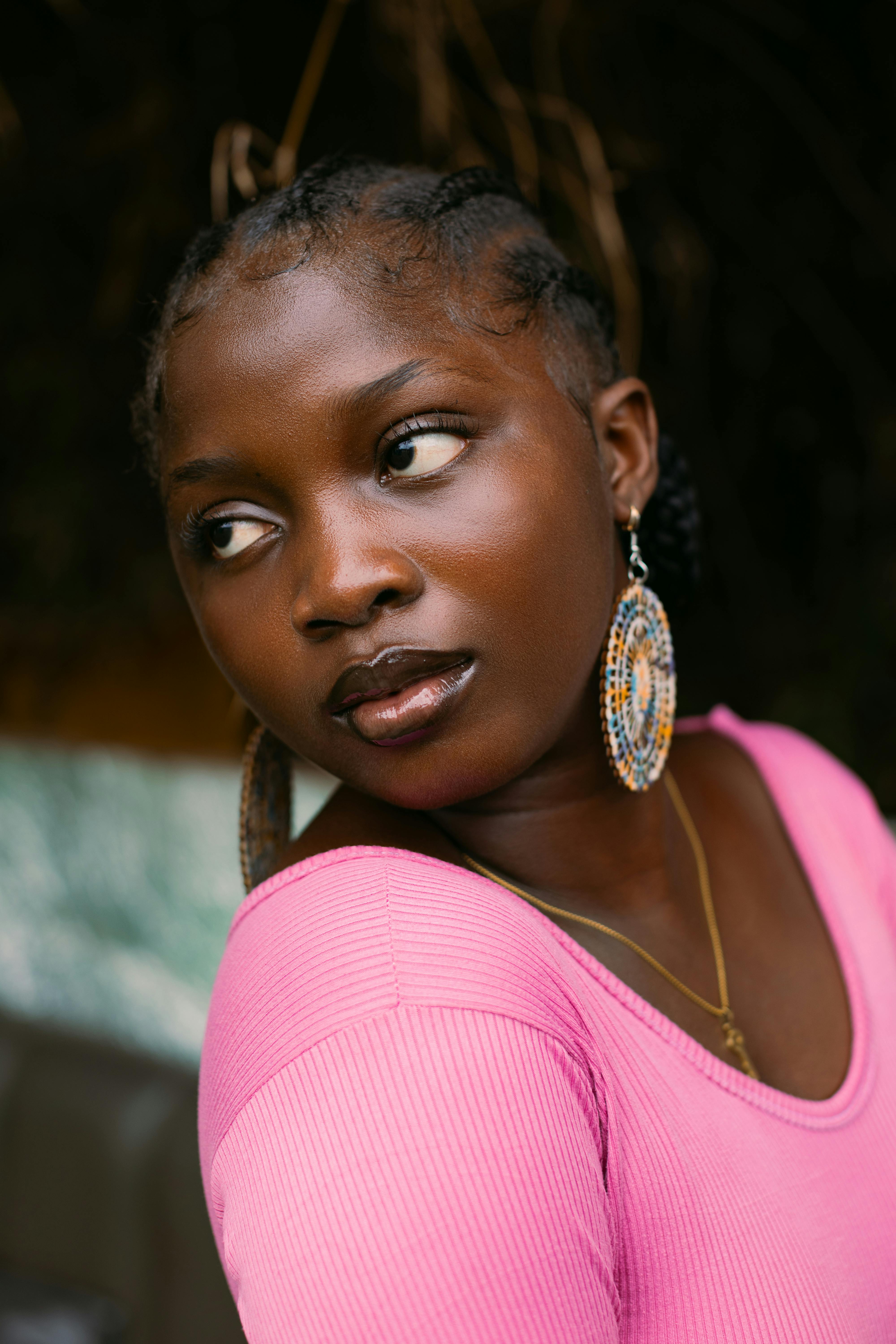 Portrait of an African Woman Wearing Pink Blouse · Free Stock Photo