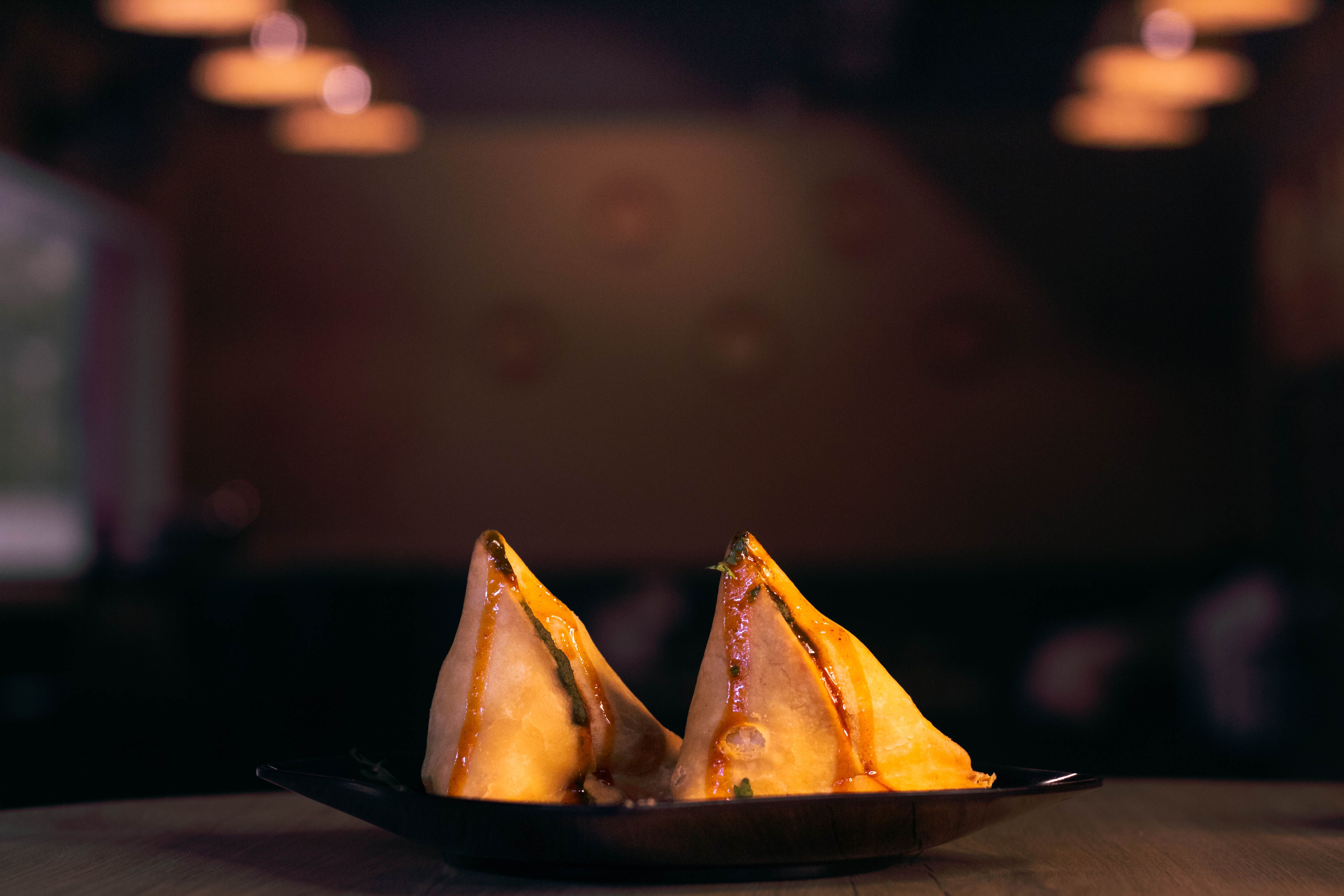 Delicious Fried Samosa in a Wicker Tray · Free Stock Photo