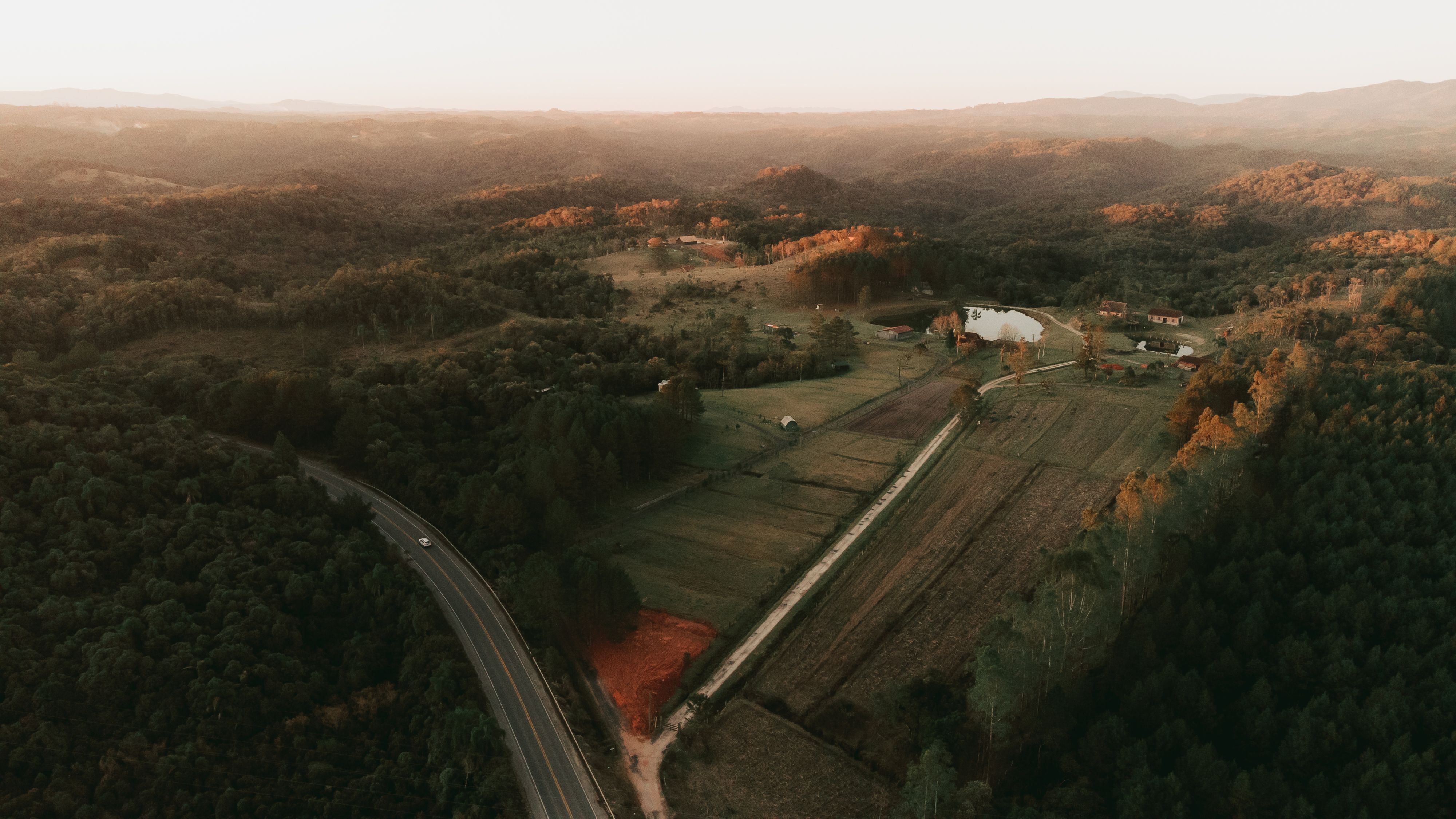 An aerial view of a farm and road · Free Stock Photo