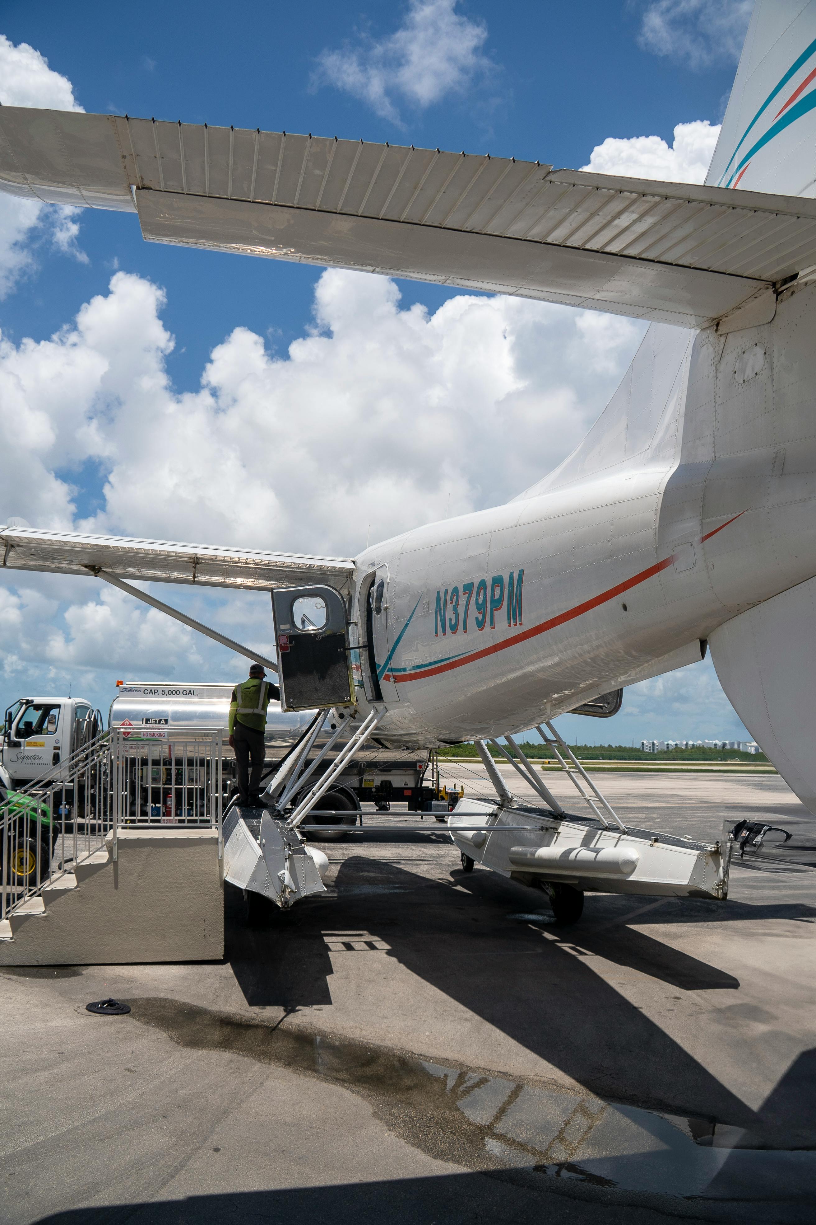 White Hydroplane Flying on the Sky · Free Stock Photo