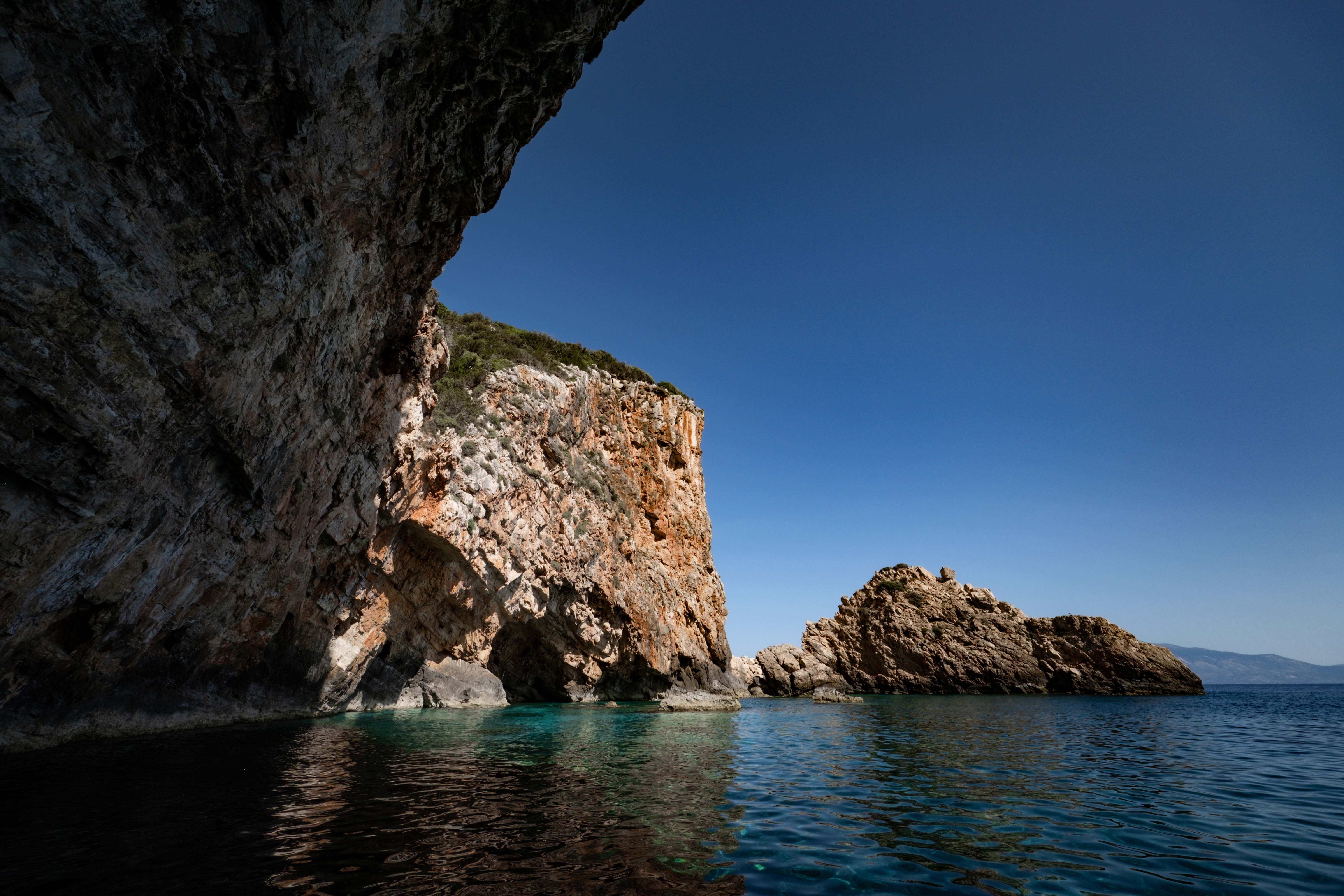 The view from the water of a cave · Free Stock Photo