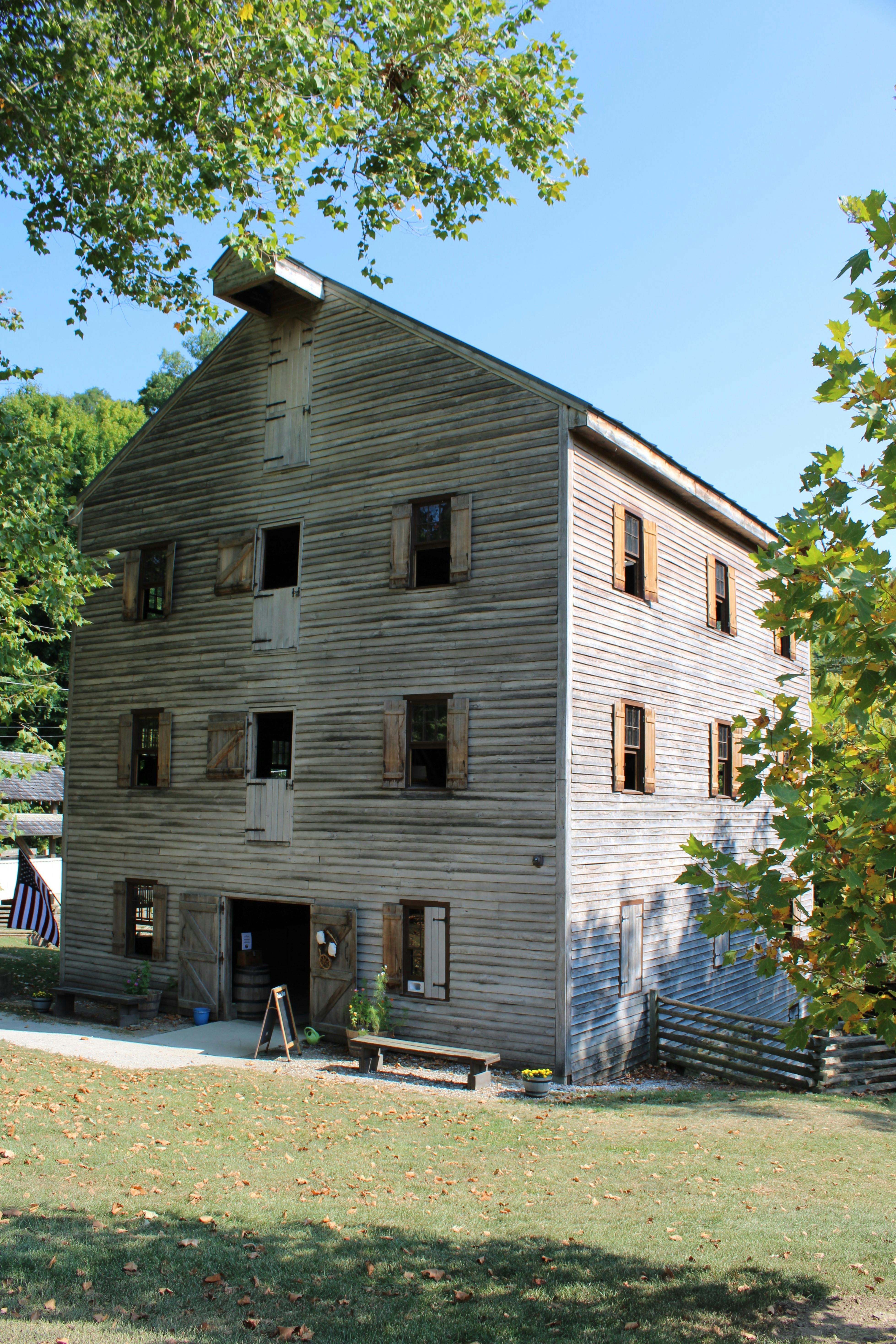 Front View Of Restored Working Grain Mill At Rock Mill · Free Stock Photo