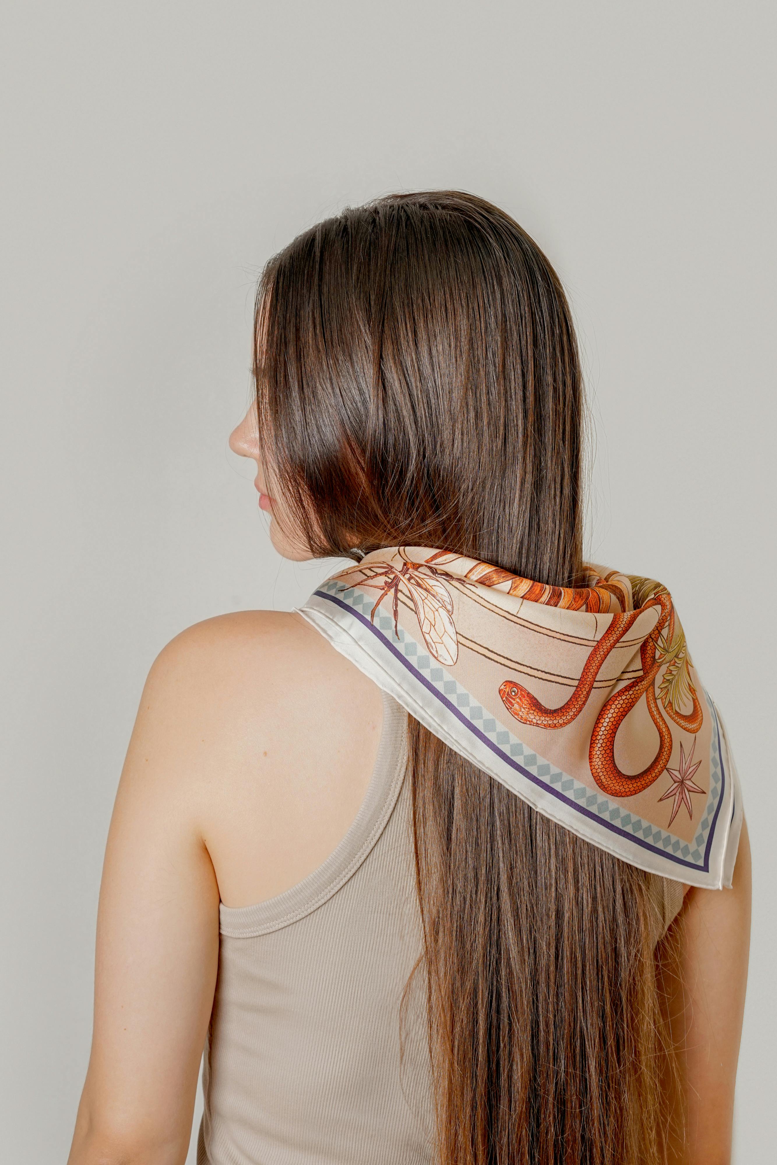 Stylish black woman in bright violet scarf near metal door · Free Stock ...