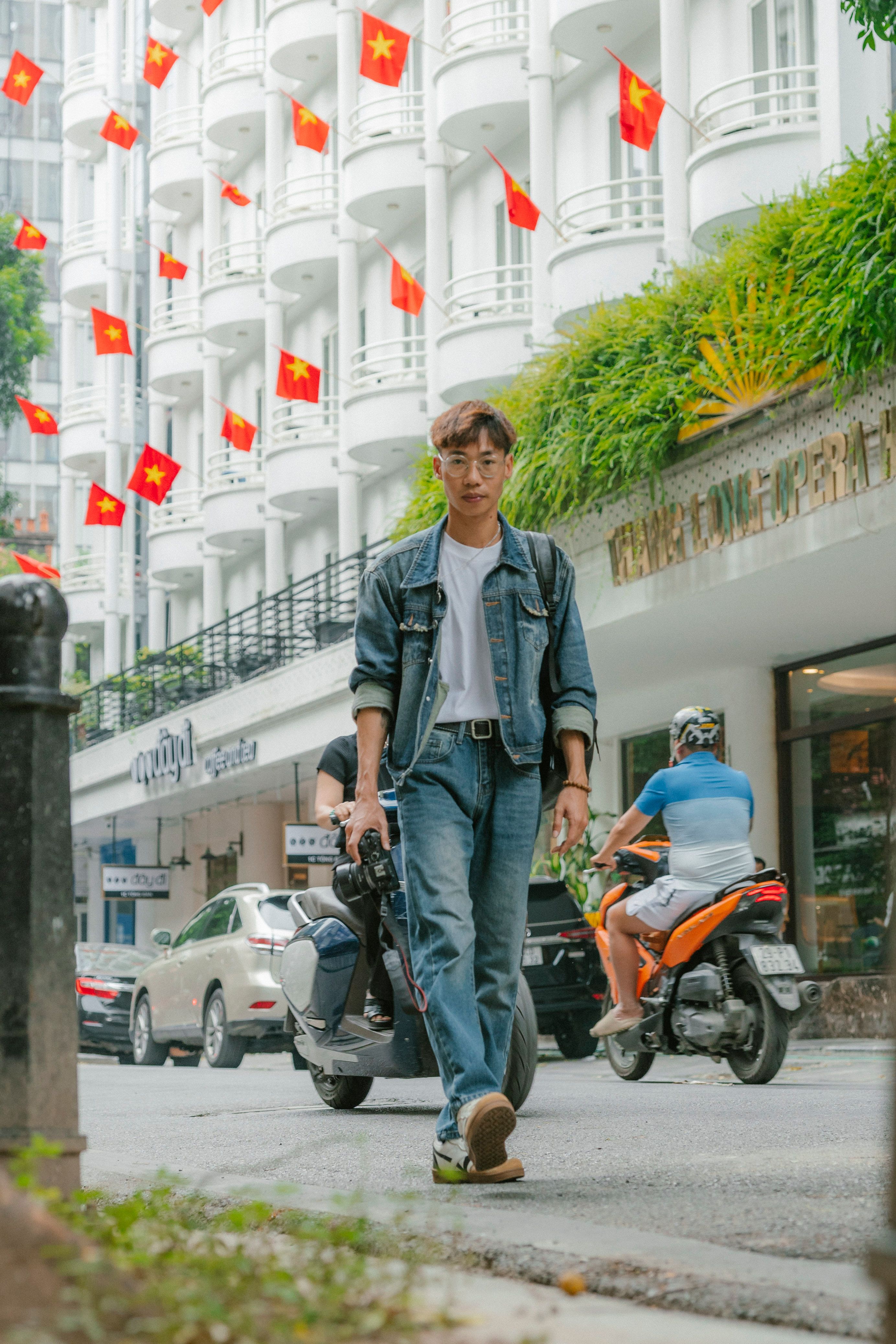 Urban Street Style in Hanoi with Vietnamese Flags · Free Stock Photo