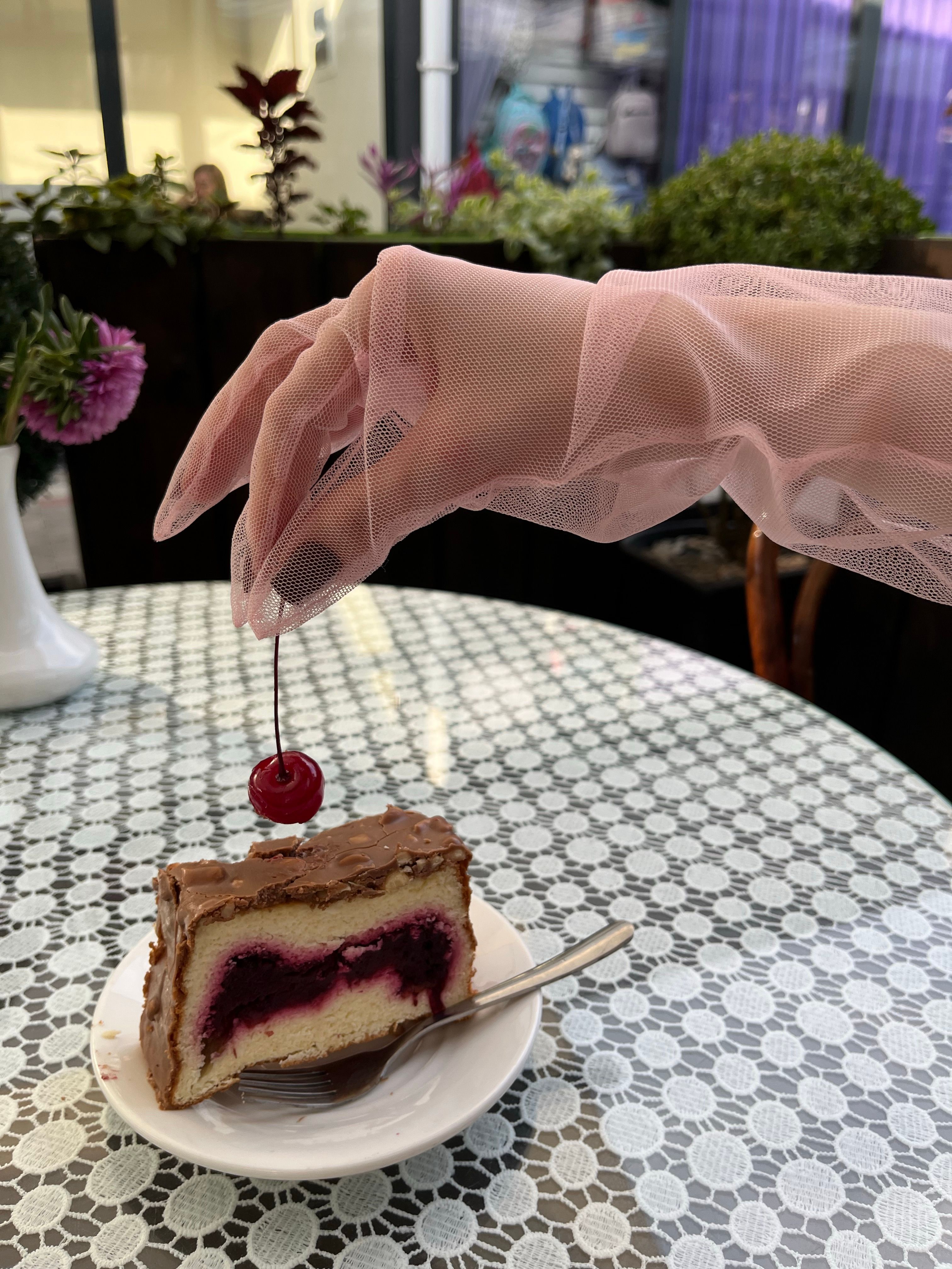 Elegant Dessert with Cherry Topping on Lace Table · Free Stock Photo