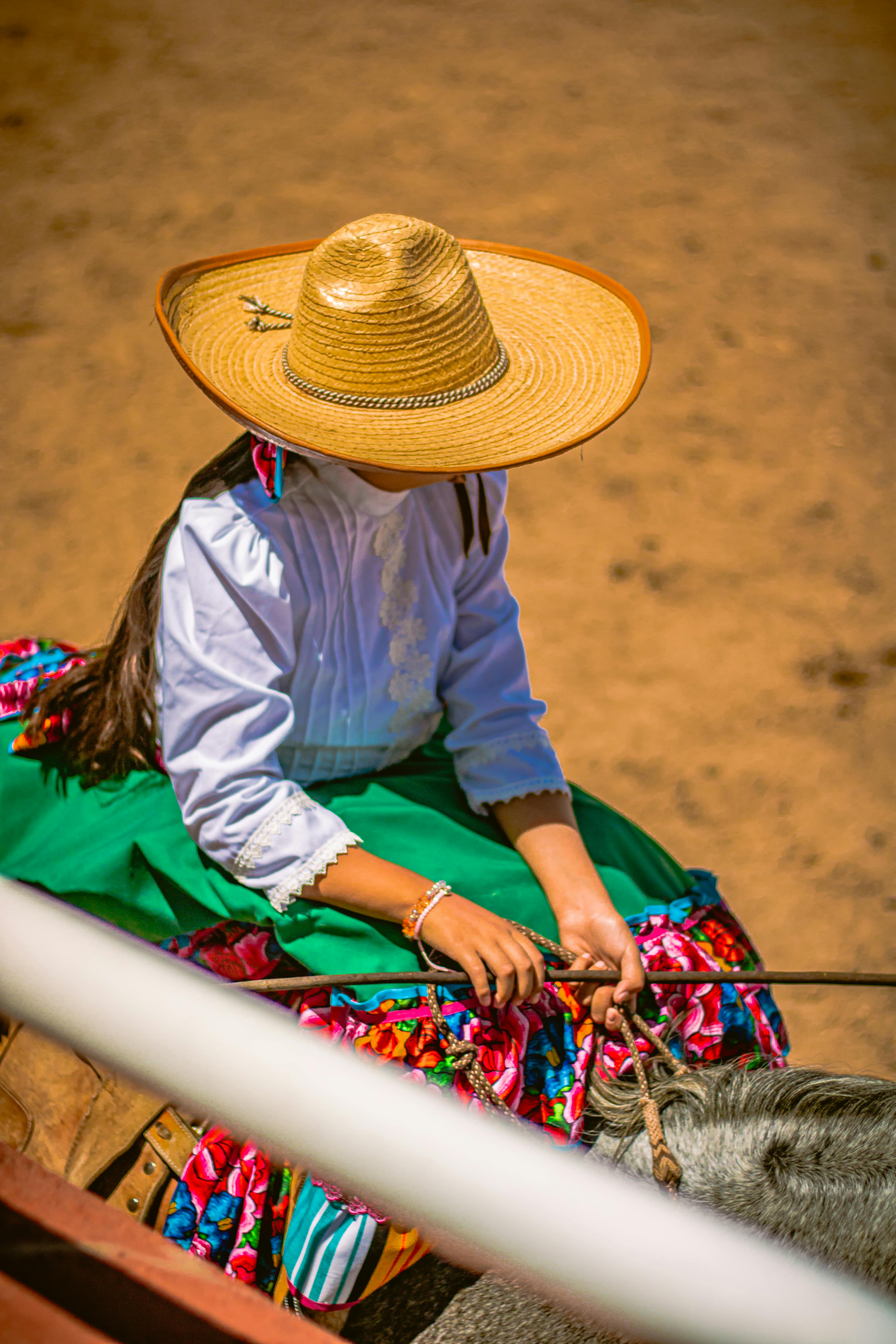 Traditional Mexican Charro in Vibrant Attire · Free Stock Photo