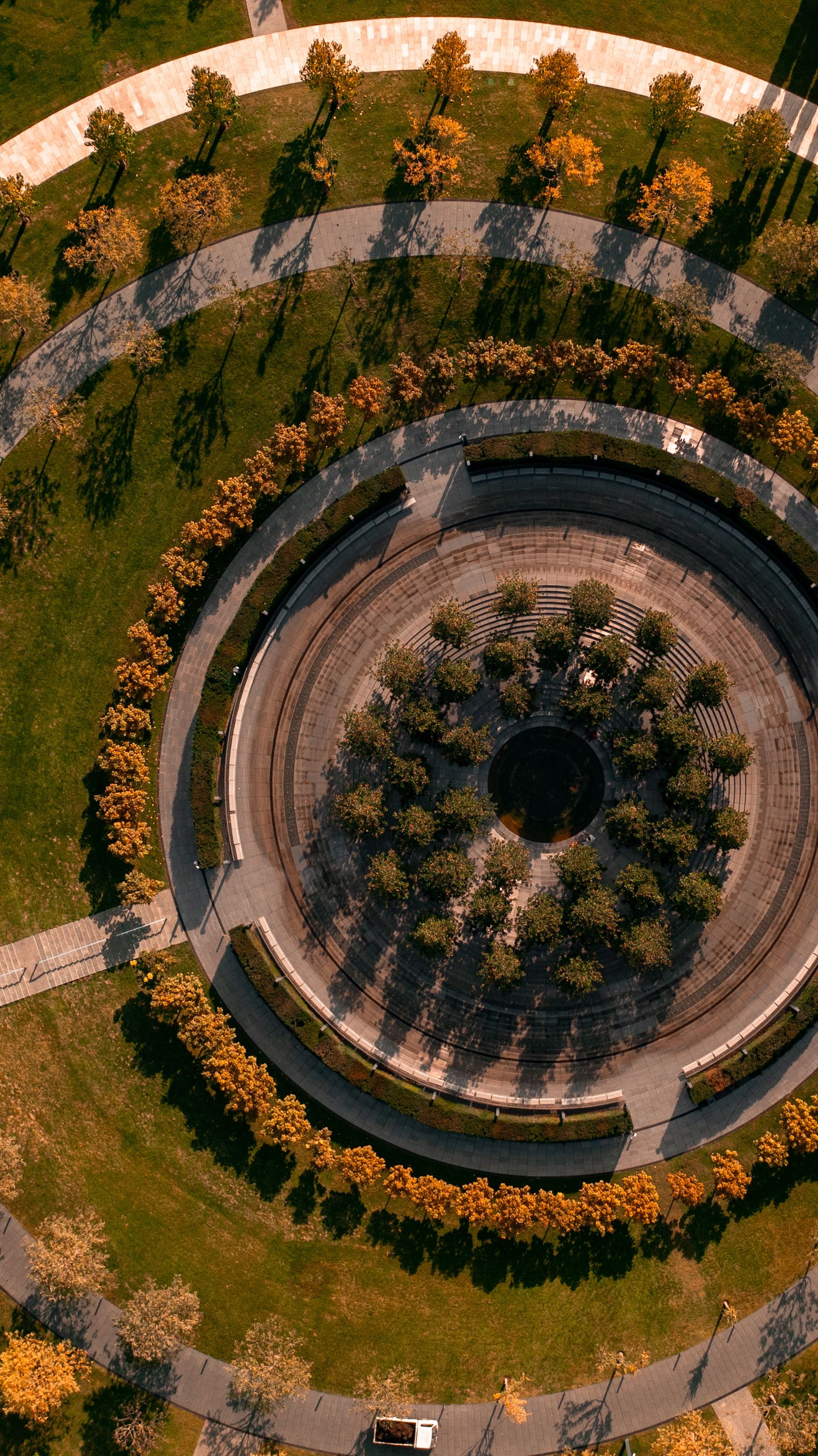 Aerial view of a circular park with trees · Free Stock Photo
