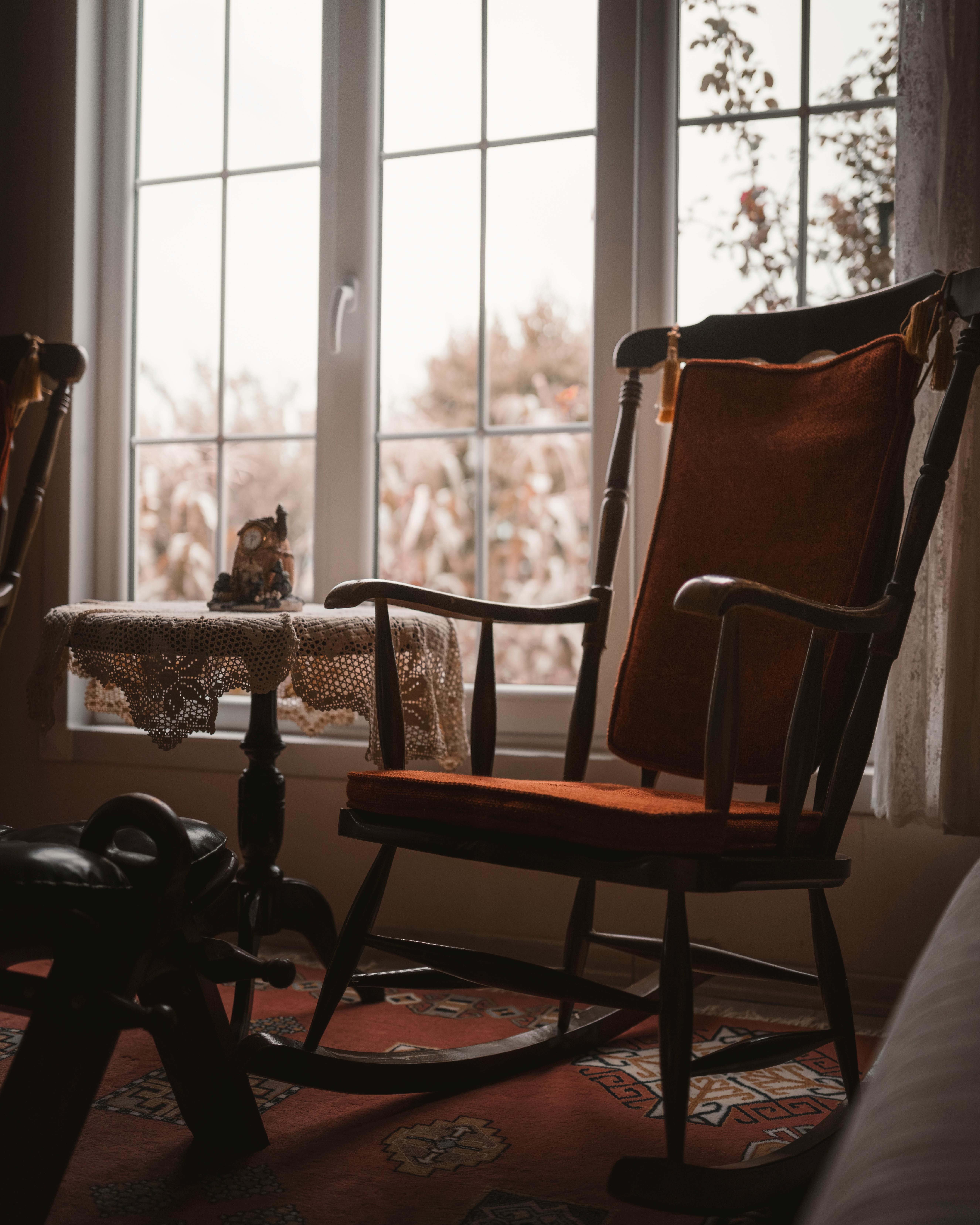 Empty Rocking Chair Standing by a Coffee Table · Free Stock Photo
