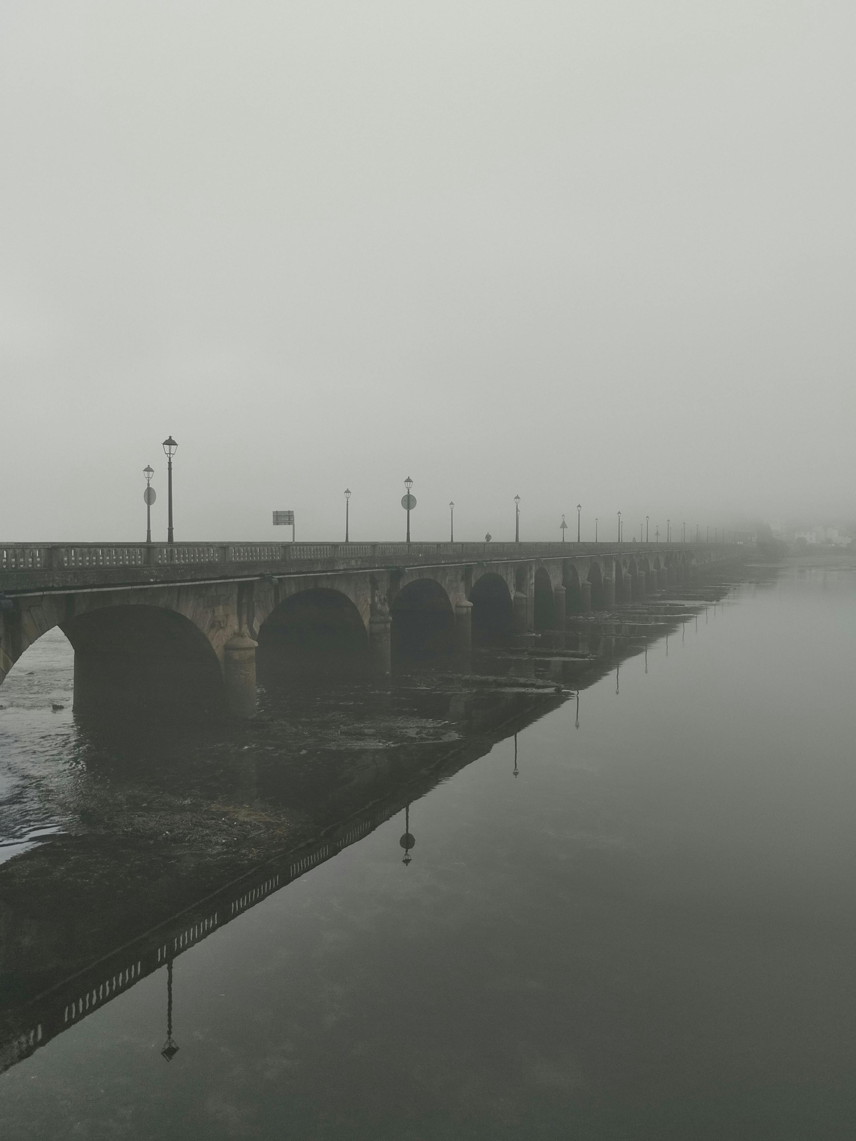 View of a Bridge in Dense Fog · Free Stock Photo