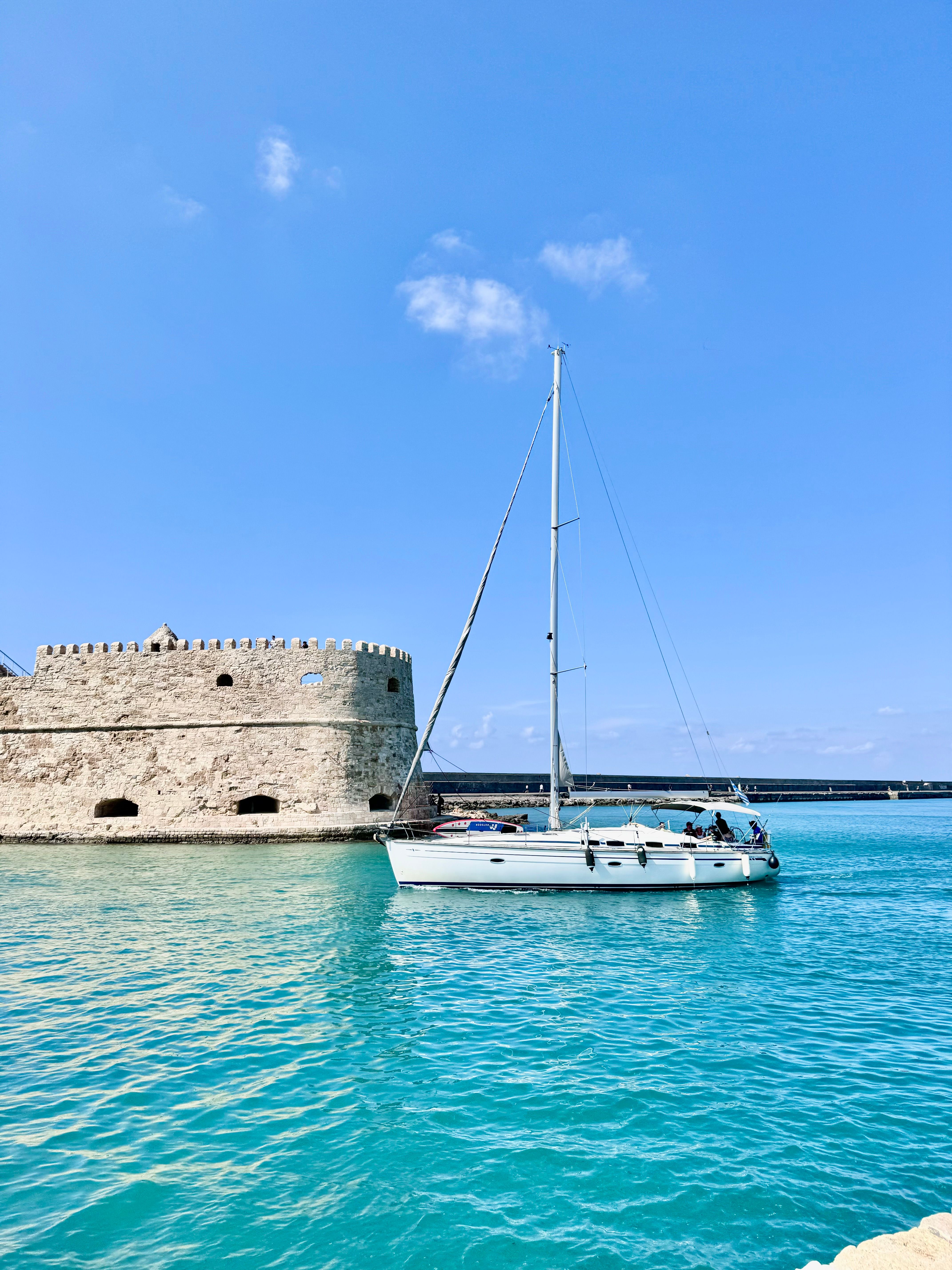 Fortress, and a Yacht on the Turquoise Water · Free Stock Photo