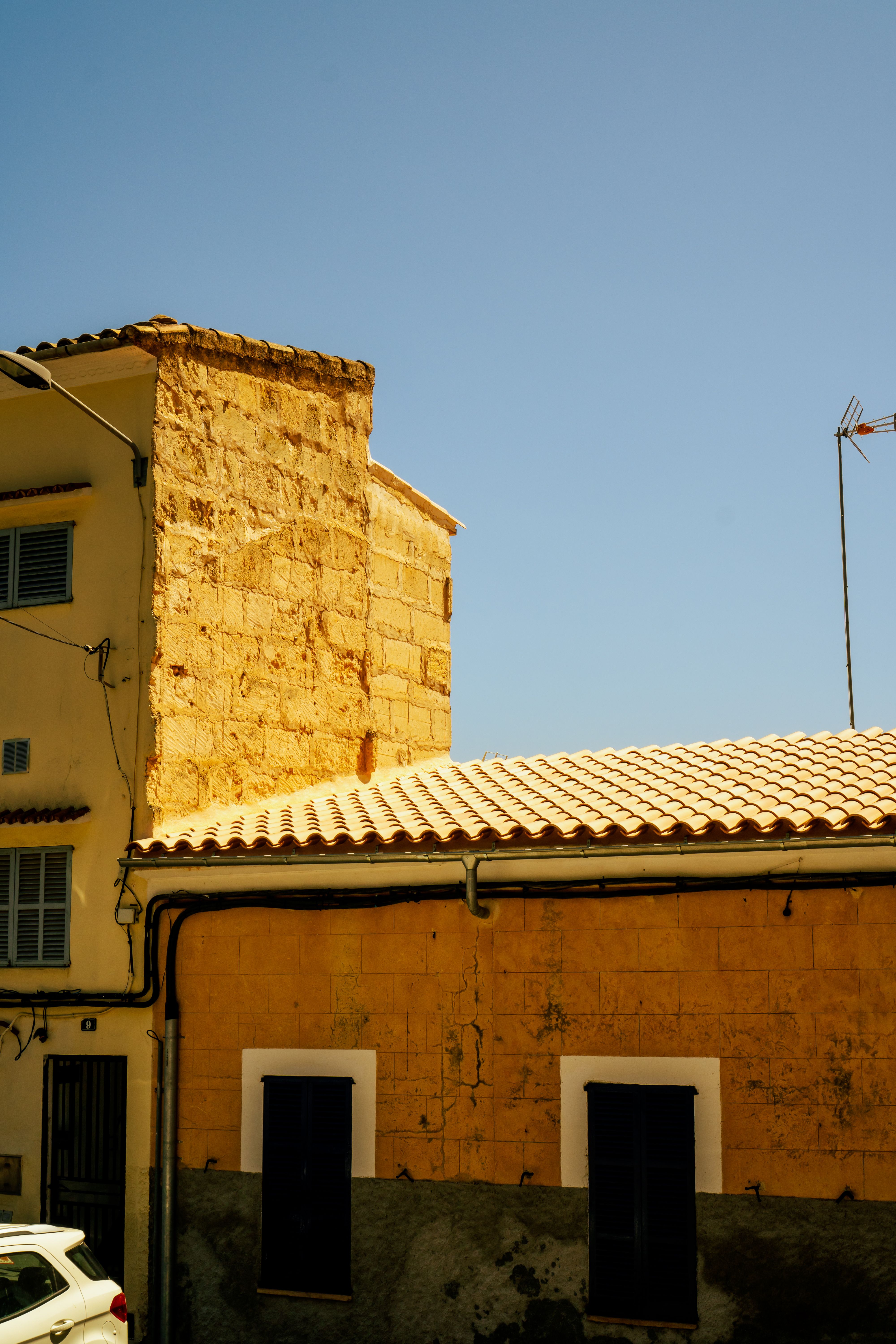 A building with a yellow roof · Free Stock Photo