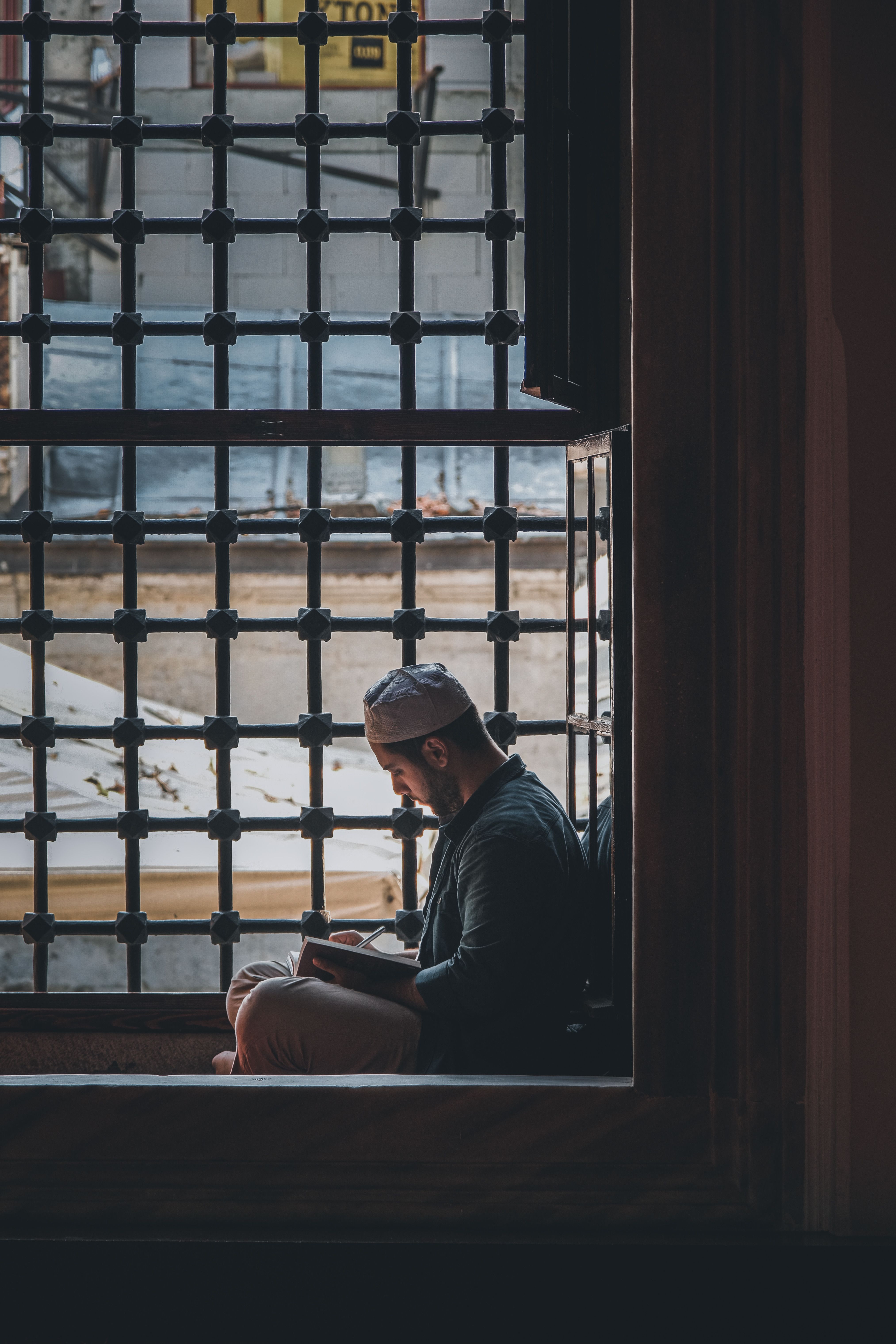 Man Leaning On Glass Window Watching The Rain · Free Stock Photo