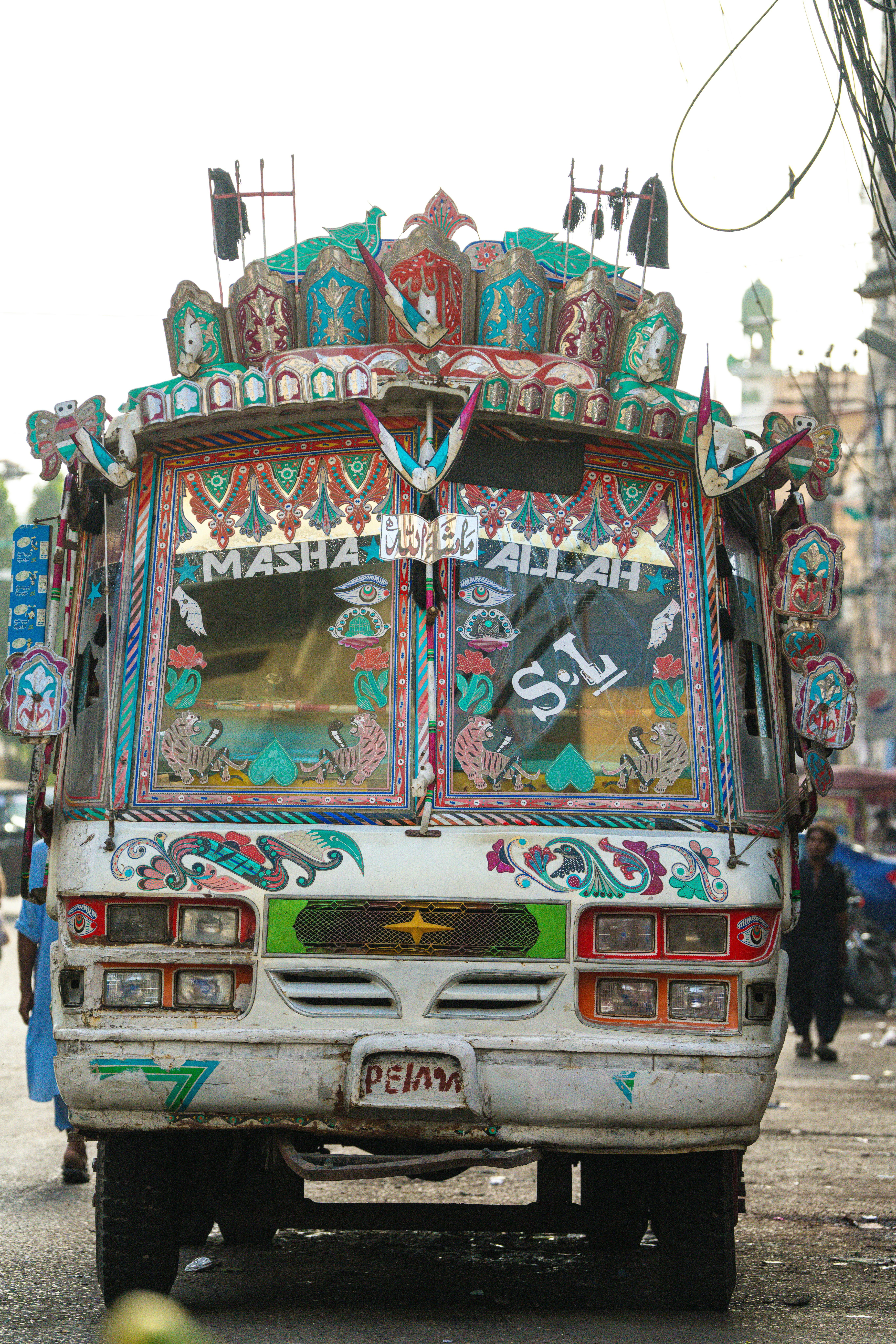 Colorful Traditional Pakistani Bus in Karachi Street · Free Stock Photo
