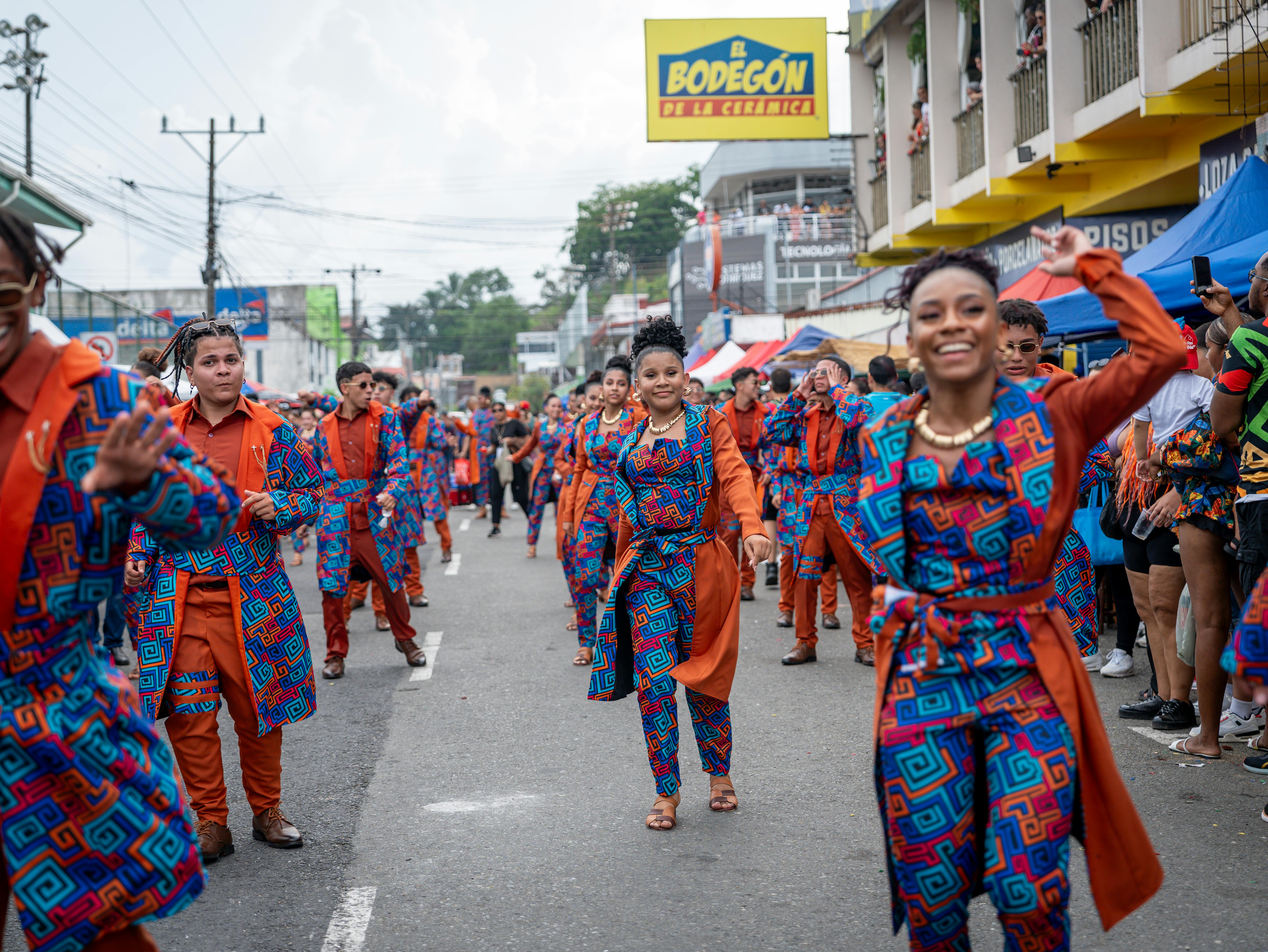 Vibrant Street Parade in Limón, Costa Rica · Free Stock Photo