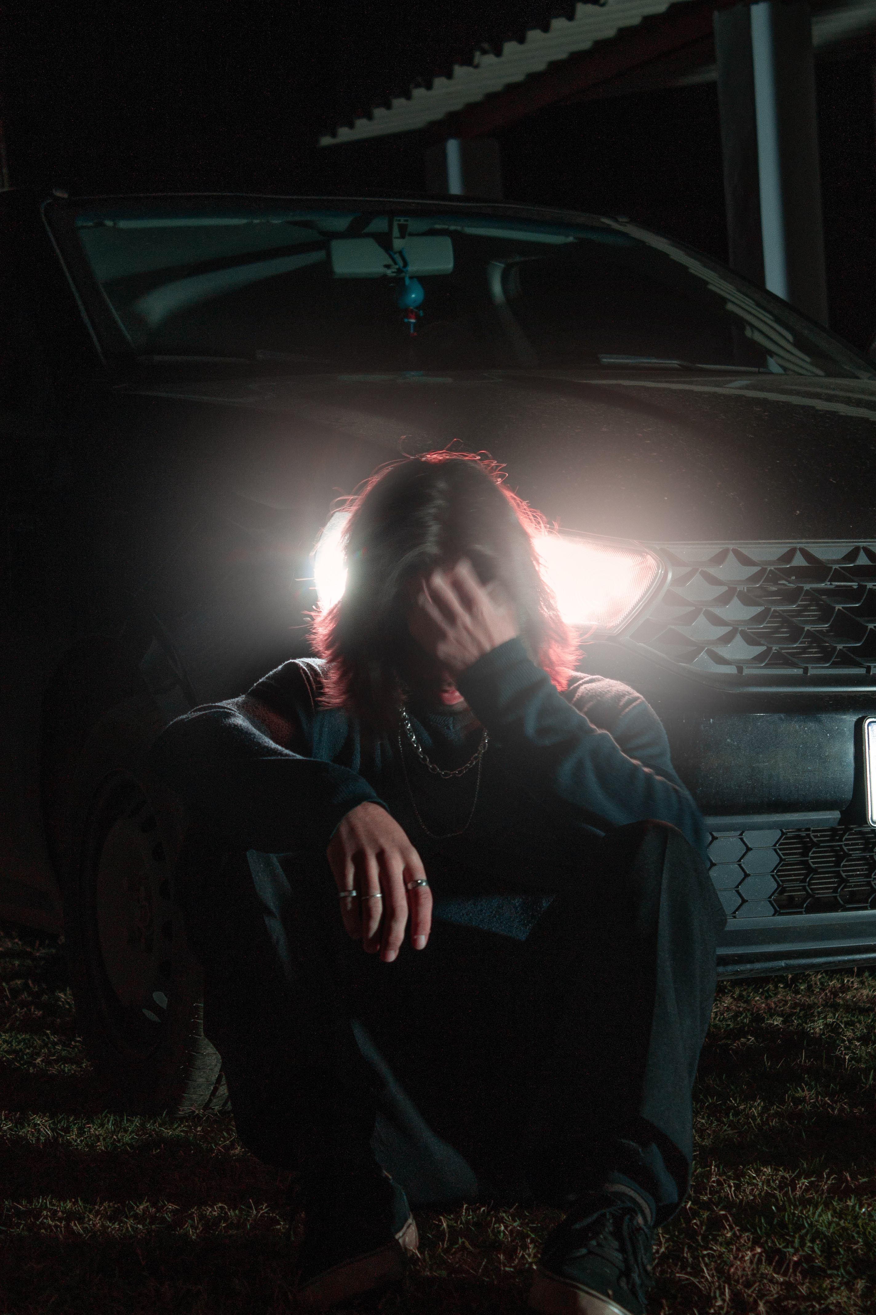 Man Sitting Beside Car · Free Stock Photo