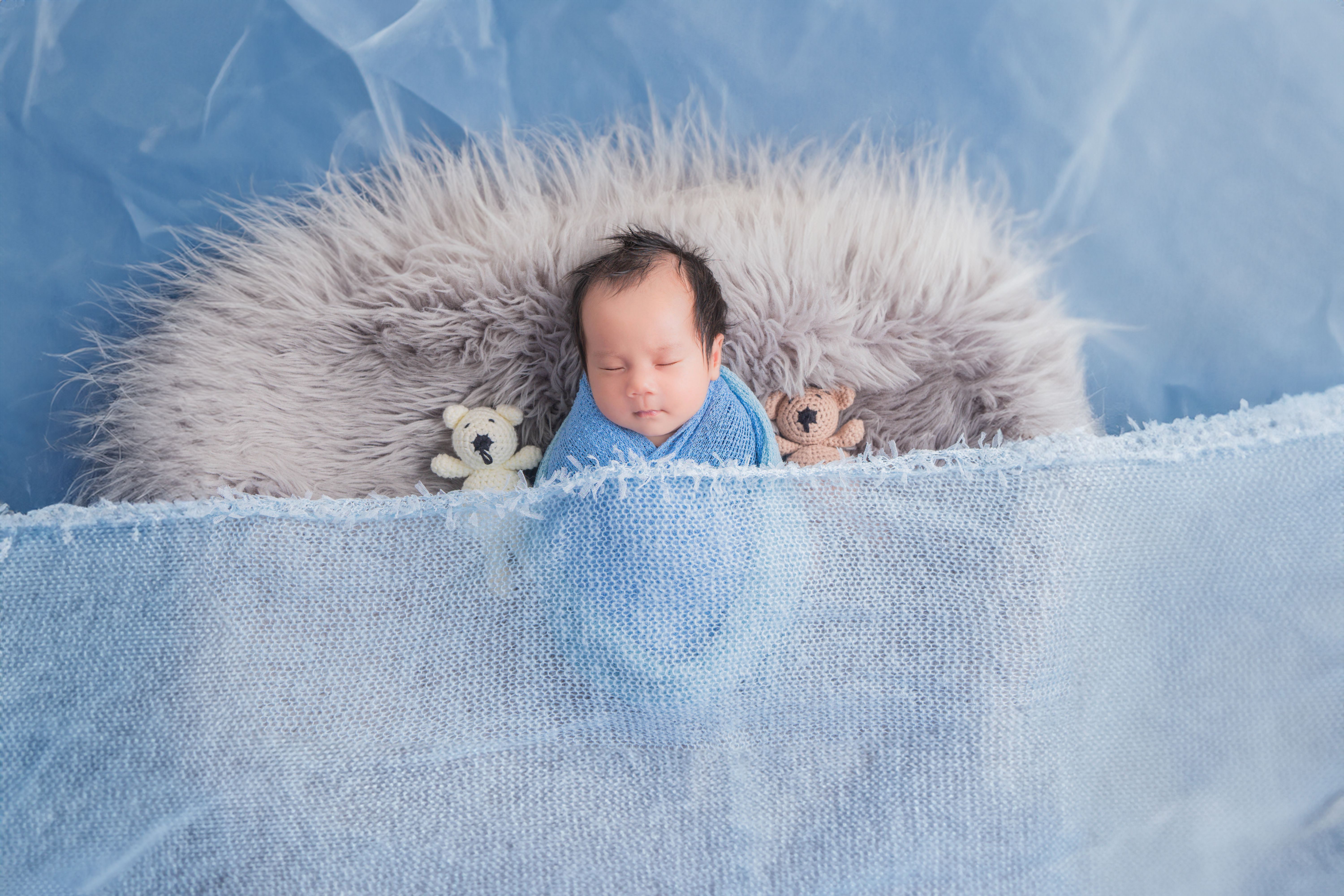 Photo Of New Born Baby Covered With Blue Blanket · Free Stock Photo
