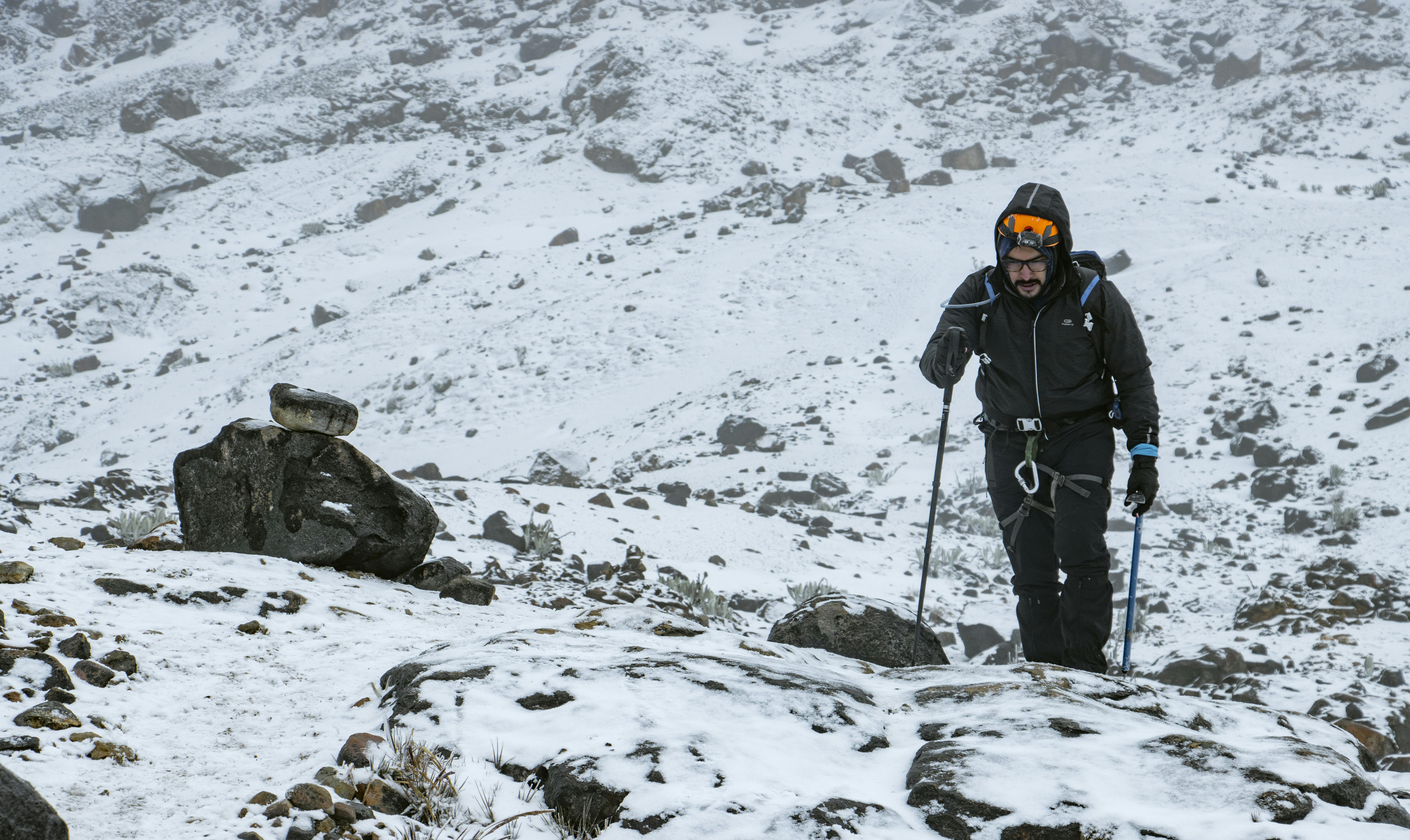 Man in Jacket Hiking in Winter · Free Stock Photo