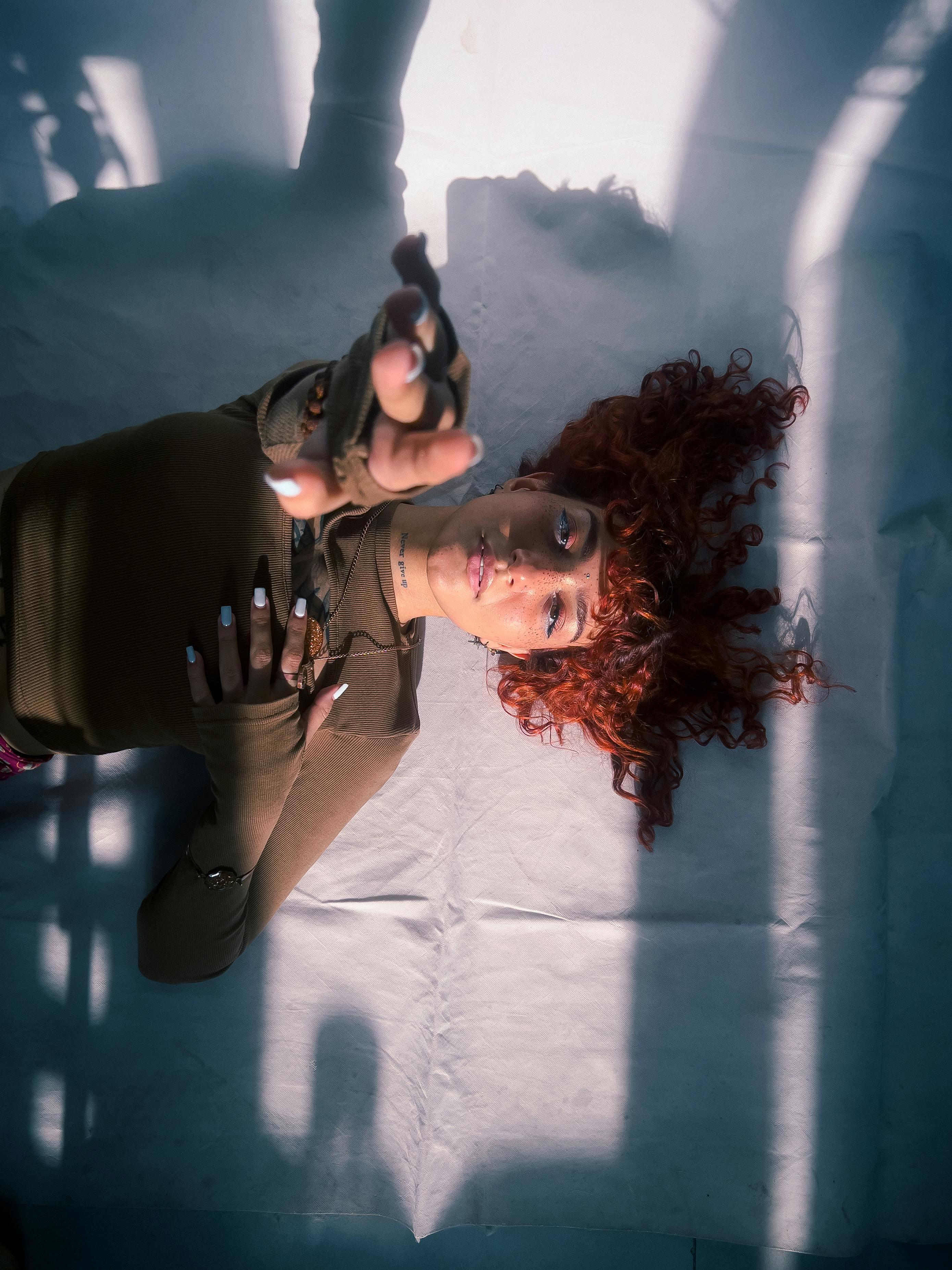 Woman Reaching out her Hand · Free Stock Photo