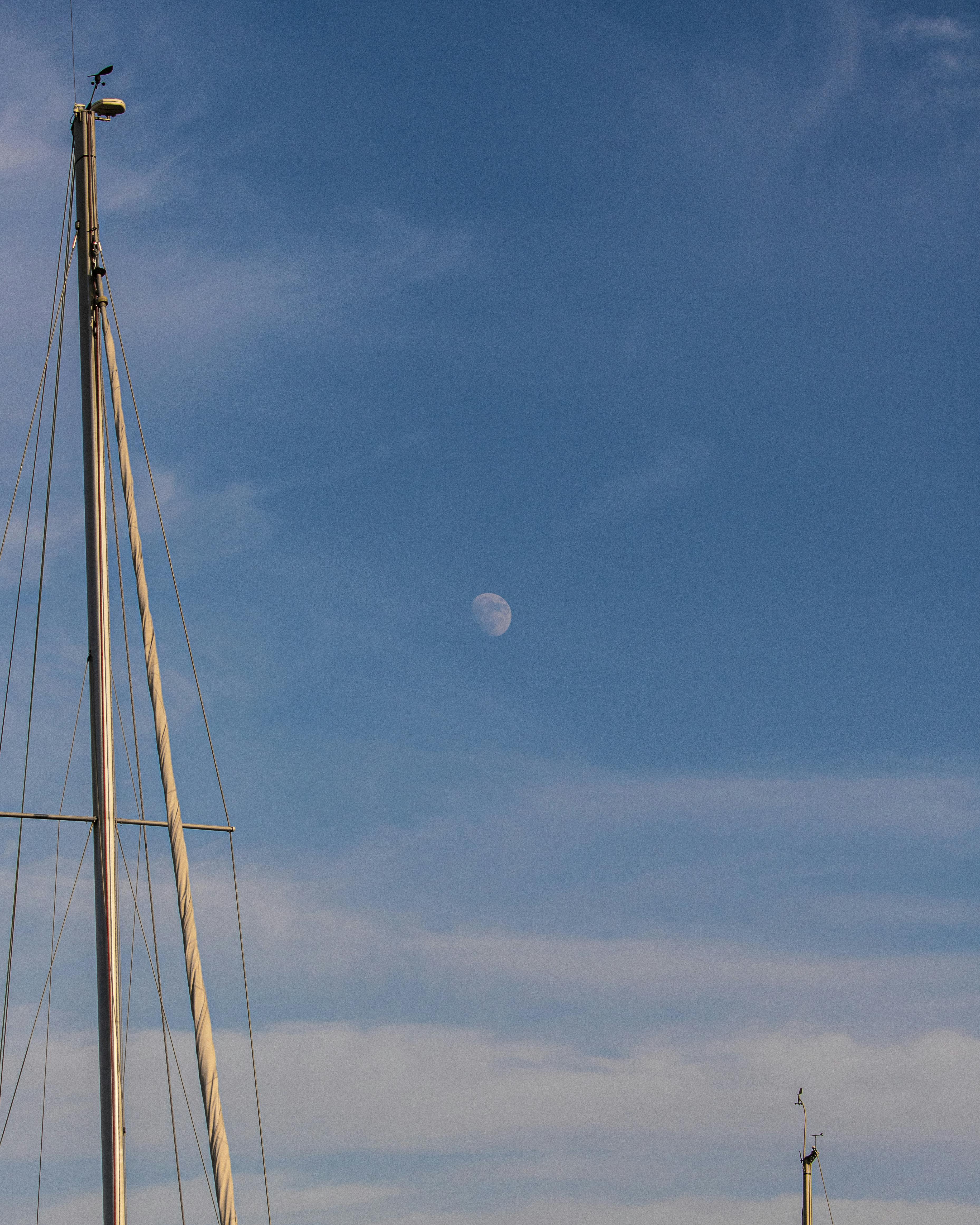 Moon between ships · Free Stock Photo