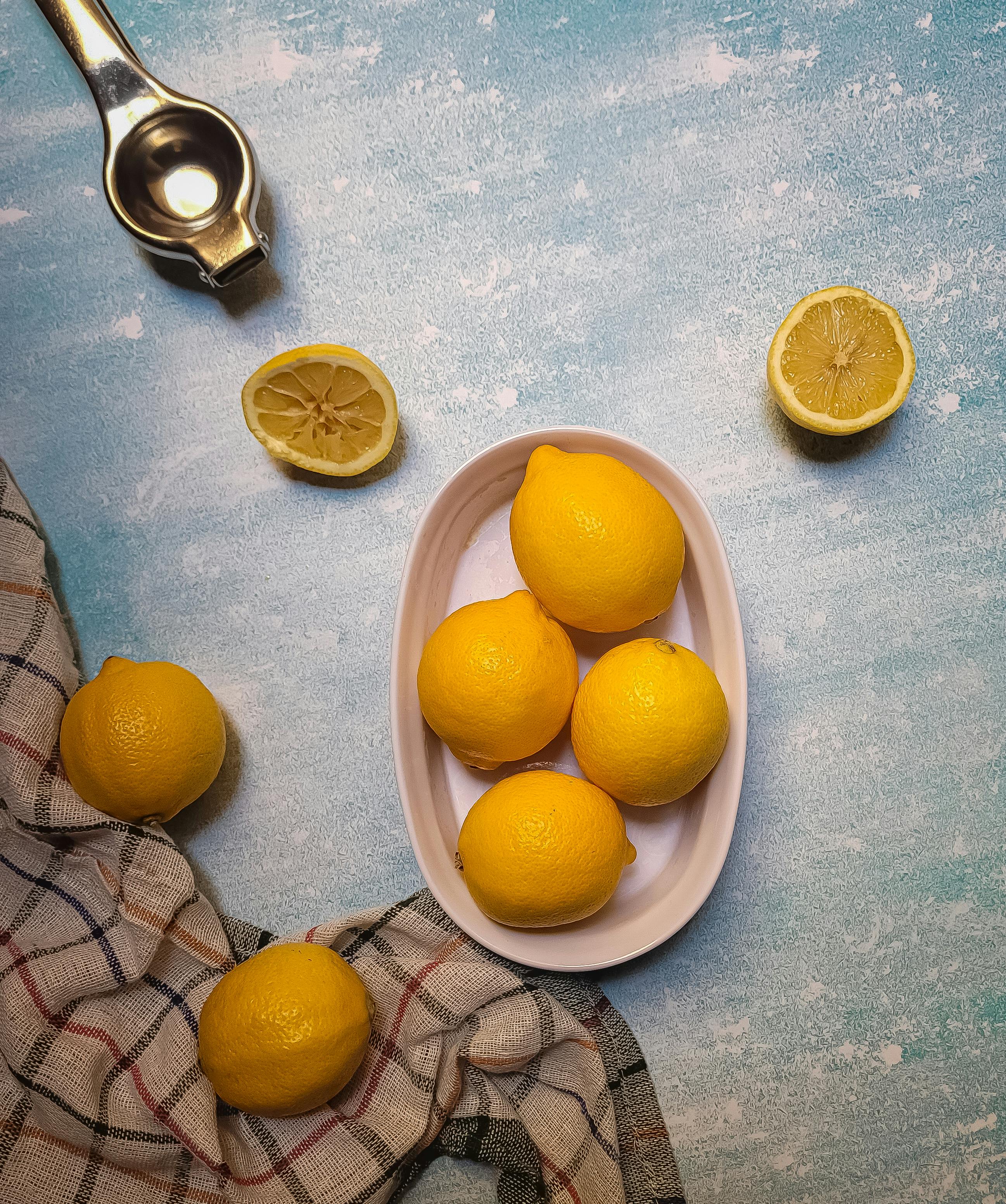 Yellow Lemonade on Clear Glass Saucer · Free Stock Photo
