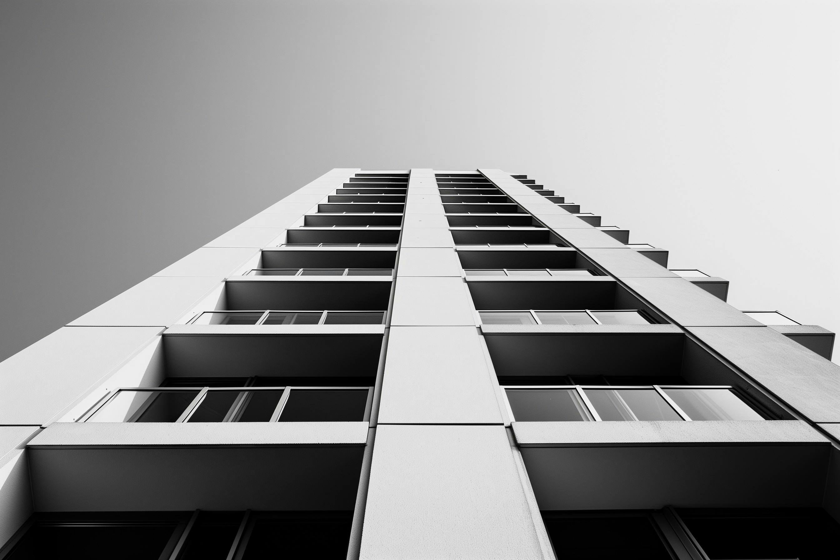 Grayscale Photo of Concrete Building · Free Stock Photo