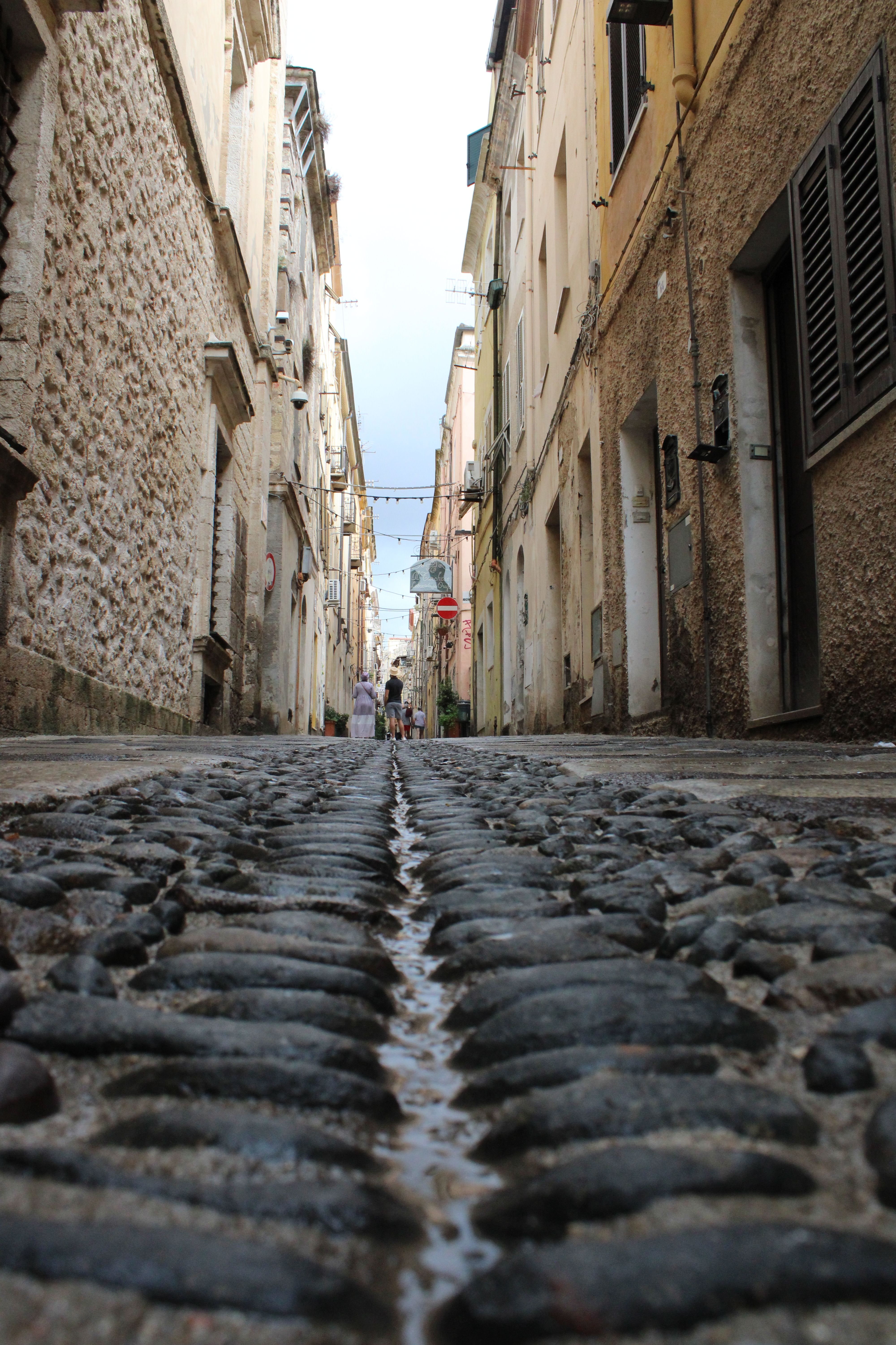 People Walking in Narrow Alley · Free Stock Photo