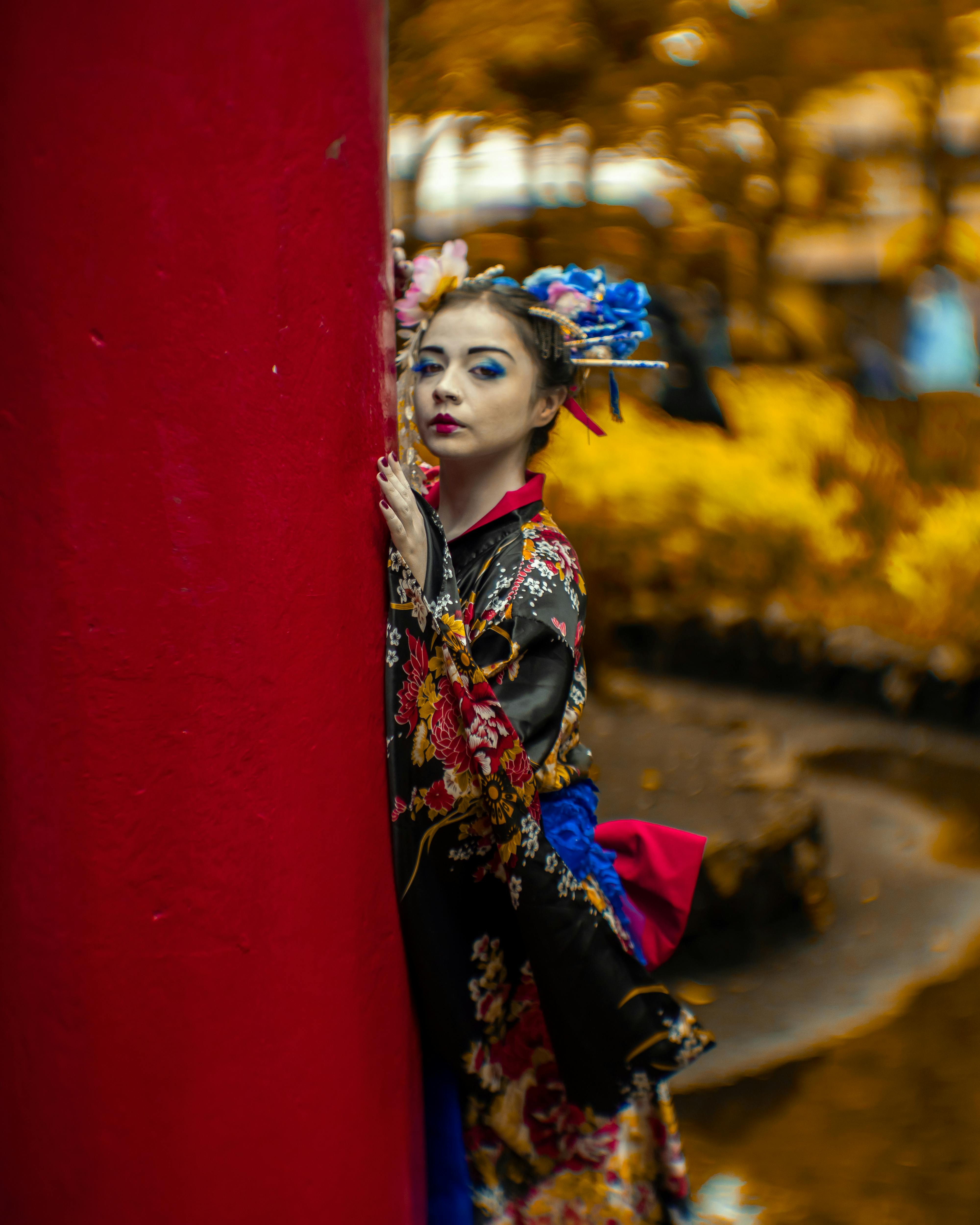 Geisha Standing in Traditional Clothing · Free Stock Photo