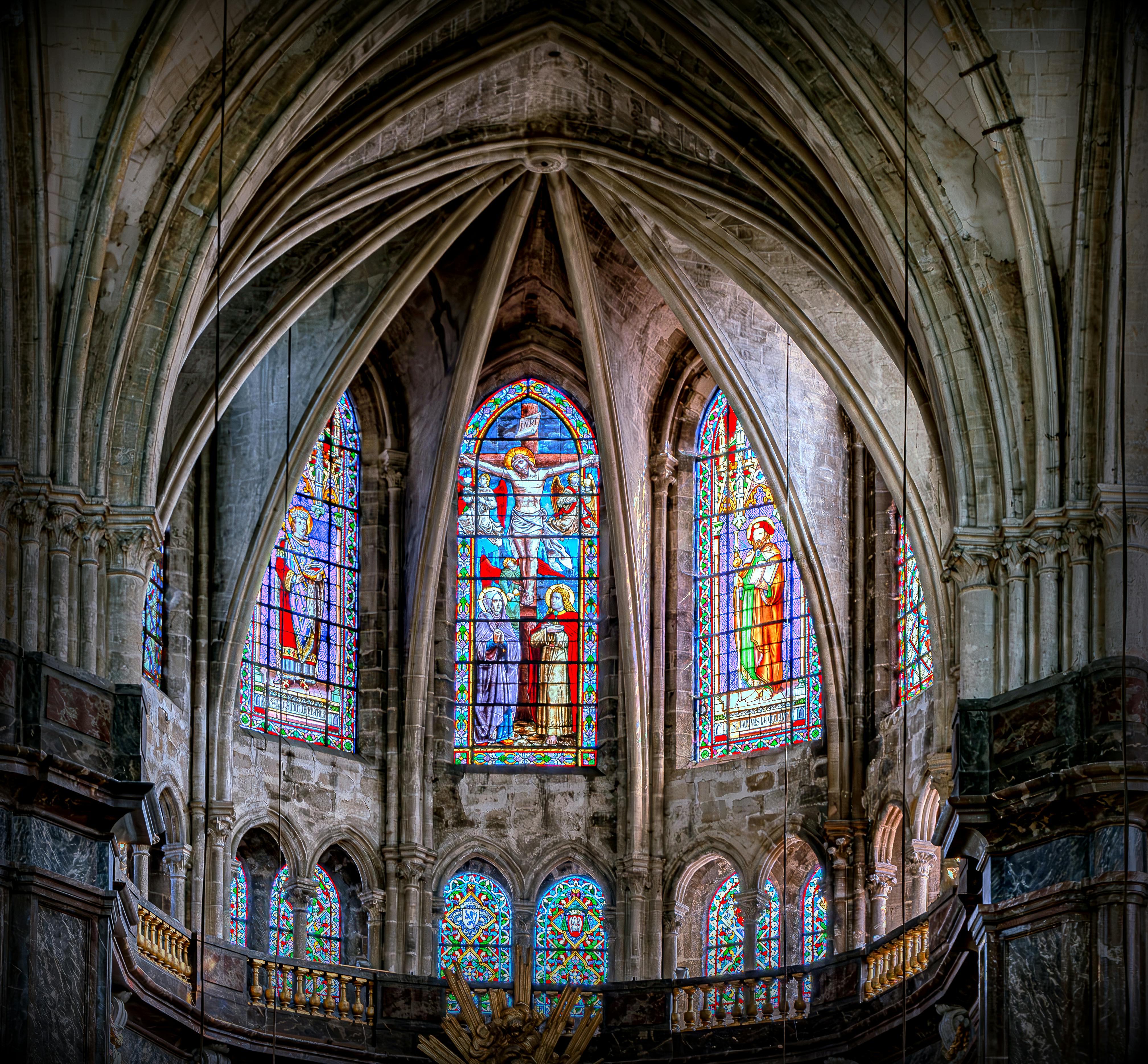 Arched stained glass window inside church · Free Stock Photo