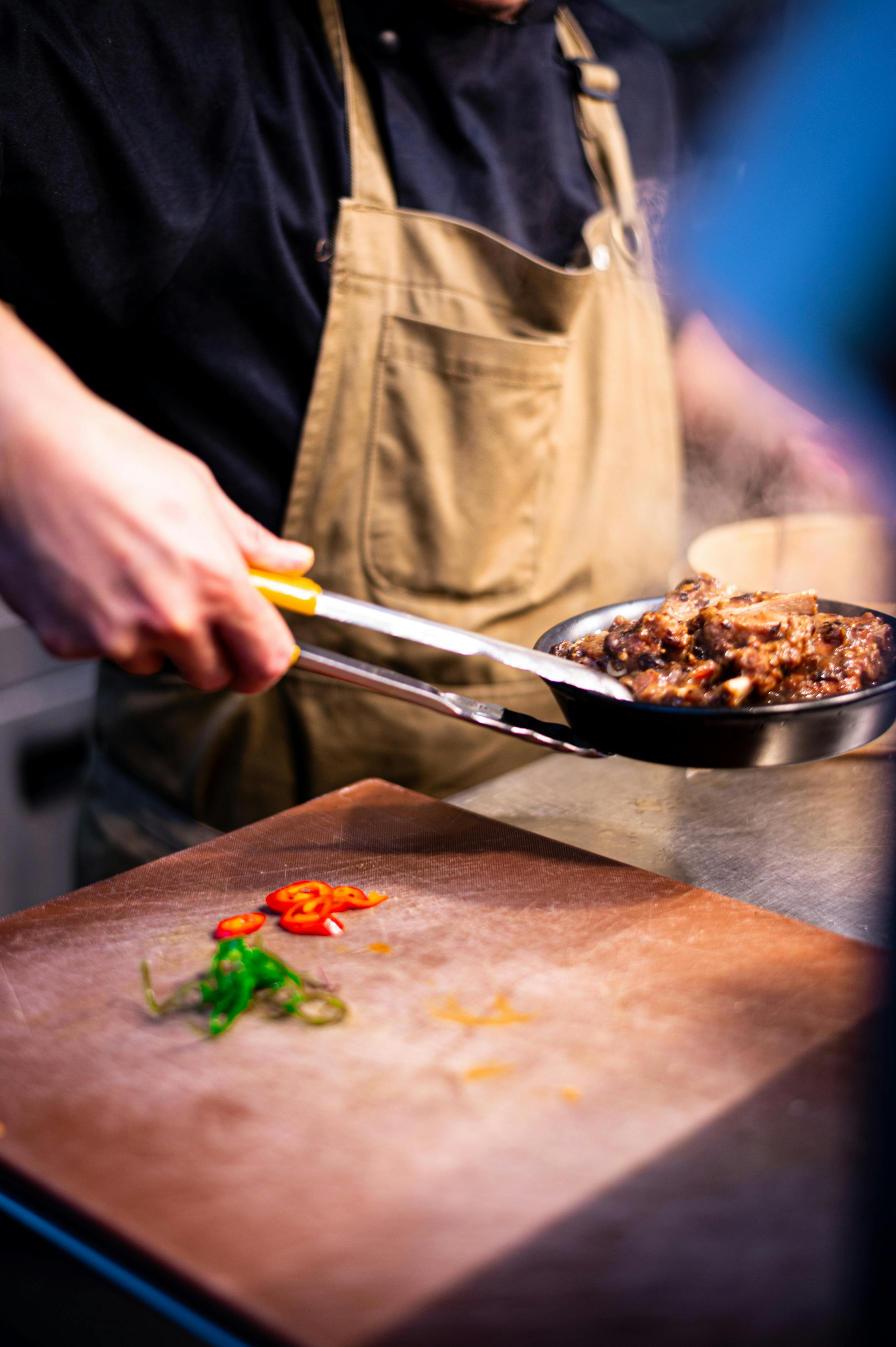 Man Cooking A Dish · Free Stock Photo