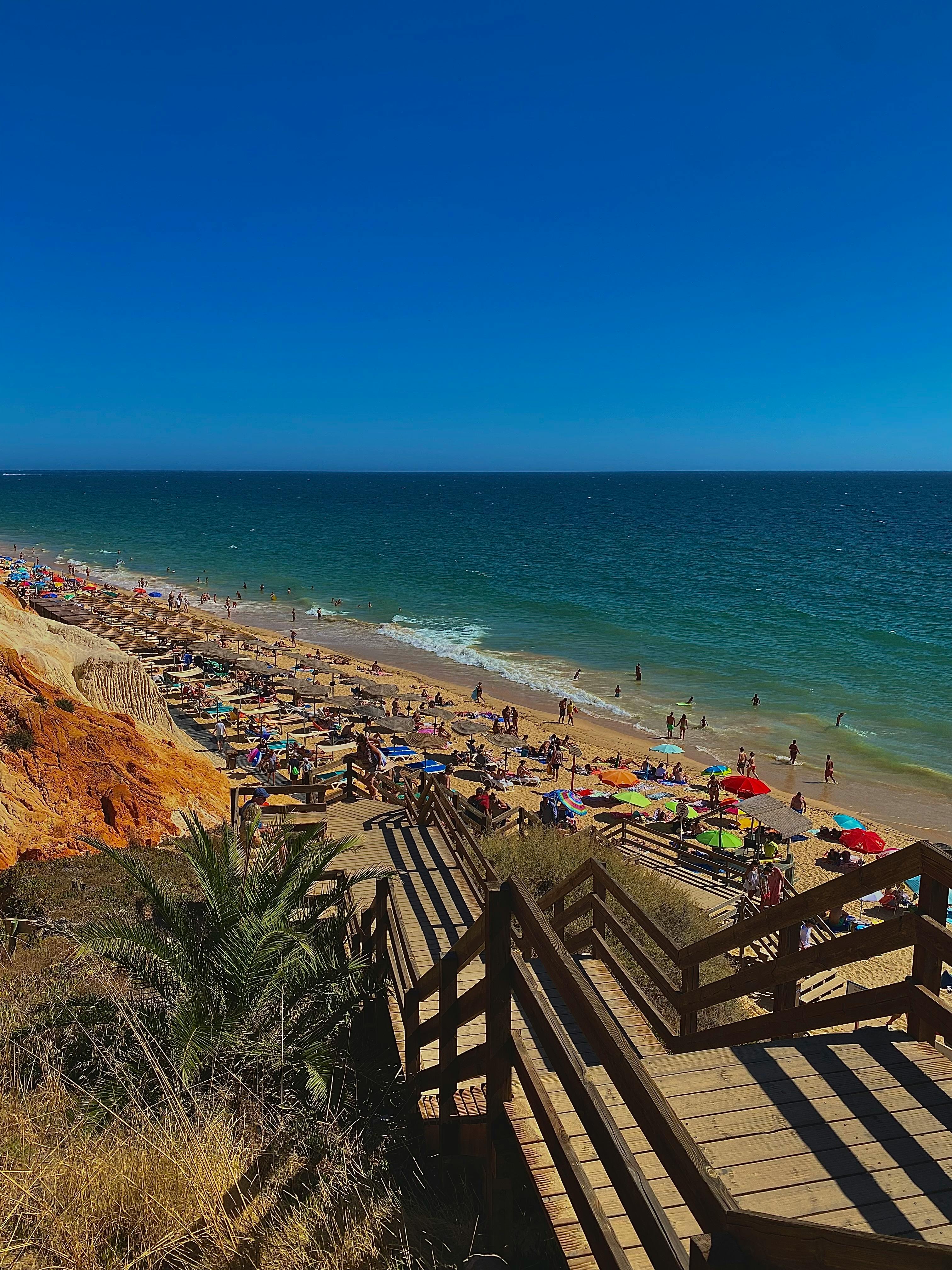 Stairs to Beach under Clear Sky · Free Stock Photo