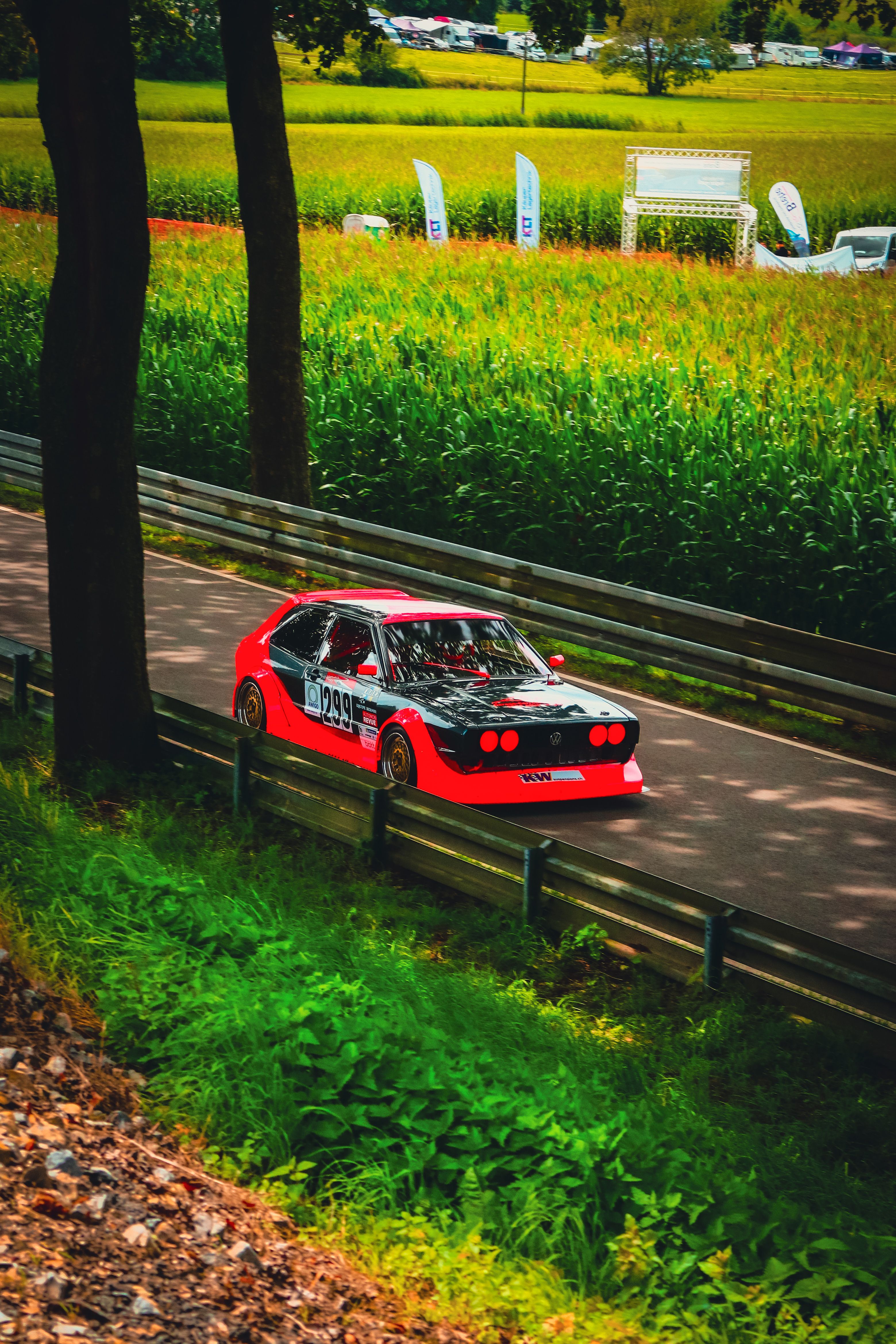 Rally Car on Road between Fields · Free Stock Photo